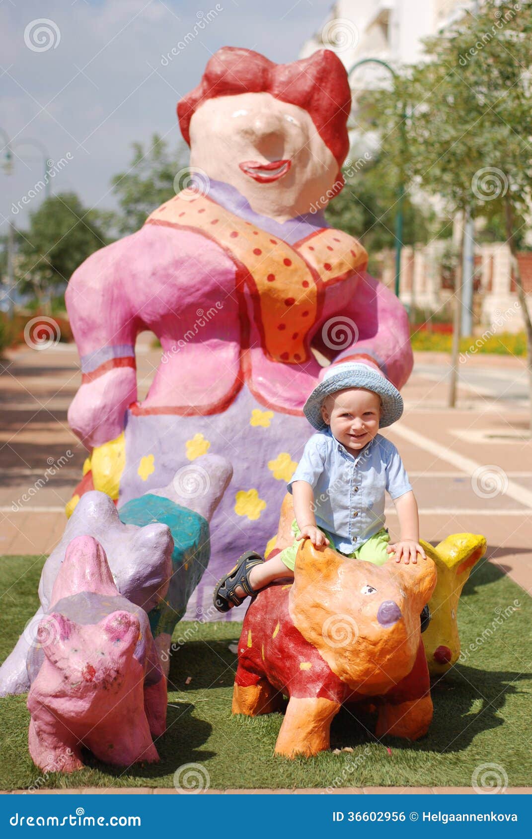 Guy rides on a dog stock photo. Image of statue, rides - 36602956
