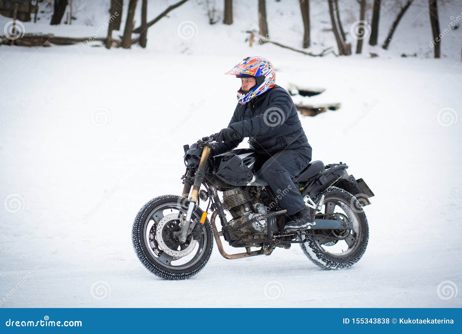 A Guy Rides a Motorcycle on a Frozen Lake Editorial Stock Photo - Image ...