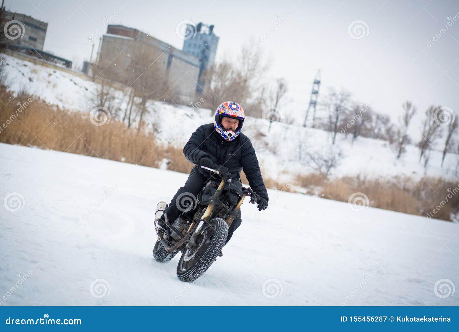 A Guy Rides a Motorcycle on a Frozen Lake Editorial Photography - Image ...