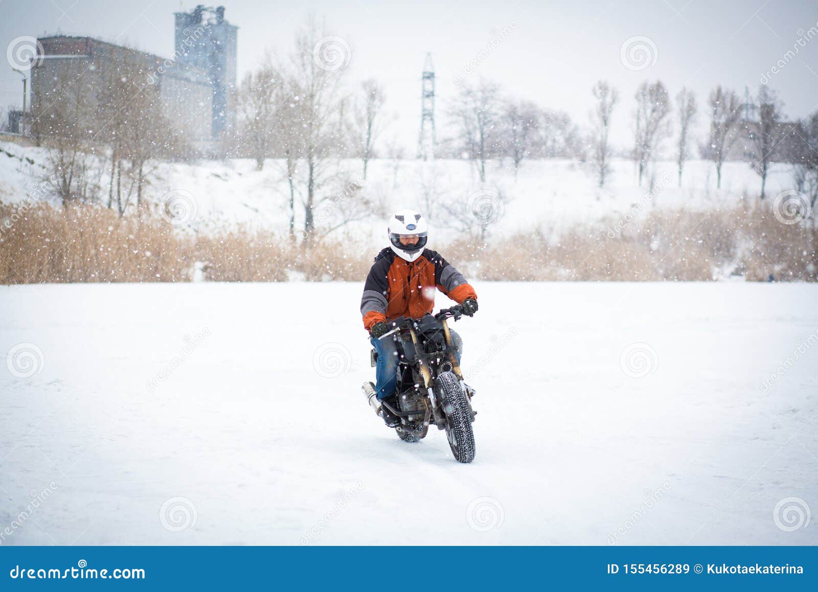 A Guy Rides a Motorcycle on a Frozen Lake Editorial Stock Image - Image ...