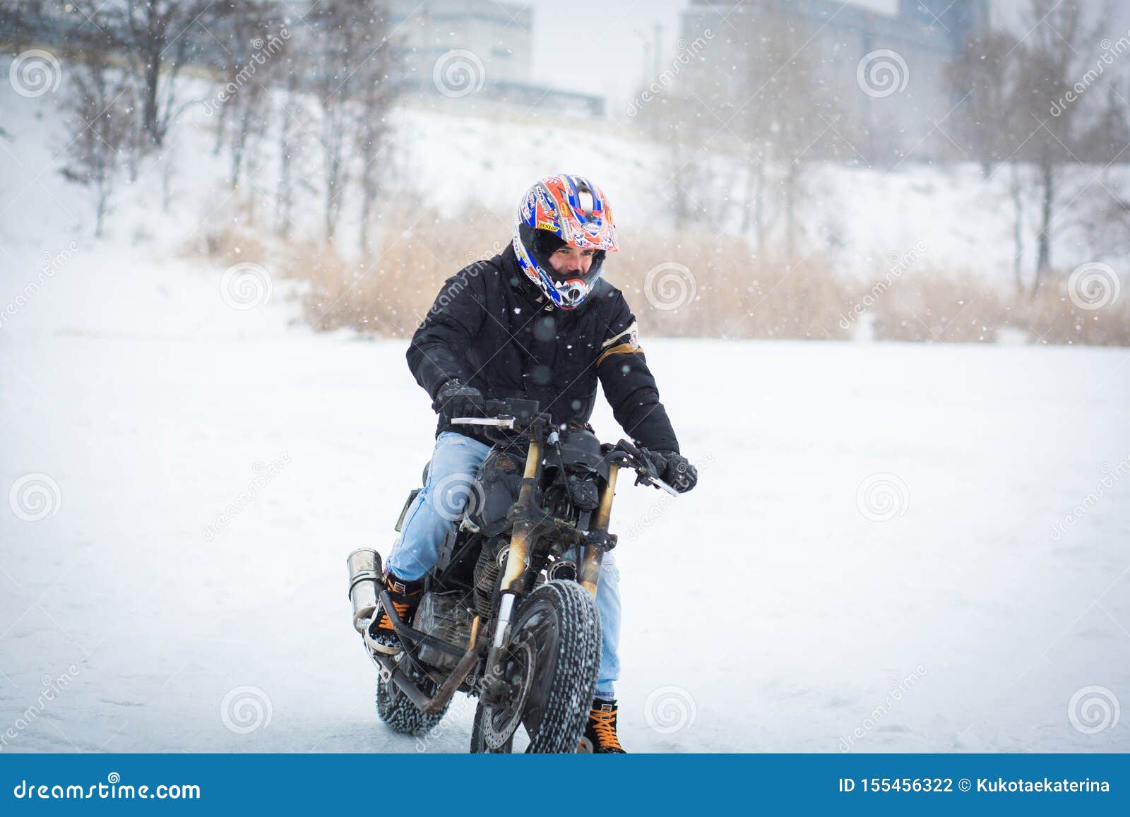 A Guy Rides a Motorcycle on a Frozen Lake Editorial Photography - Image ...
