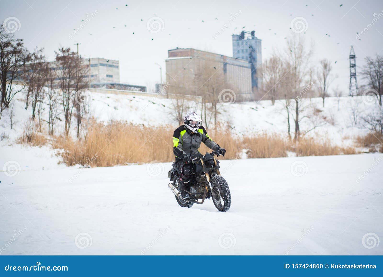 A Guy Rides a Motorcycle on a Frozen Lake Editorial Image - Image of ...