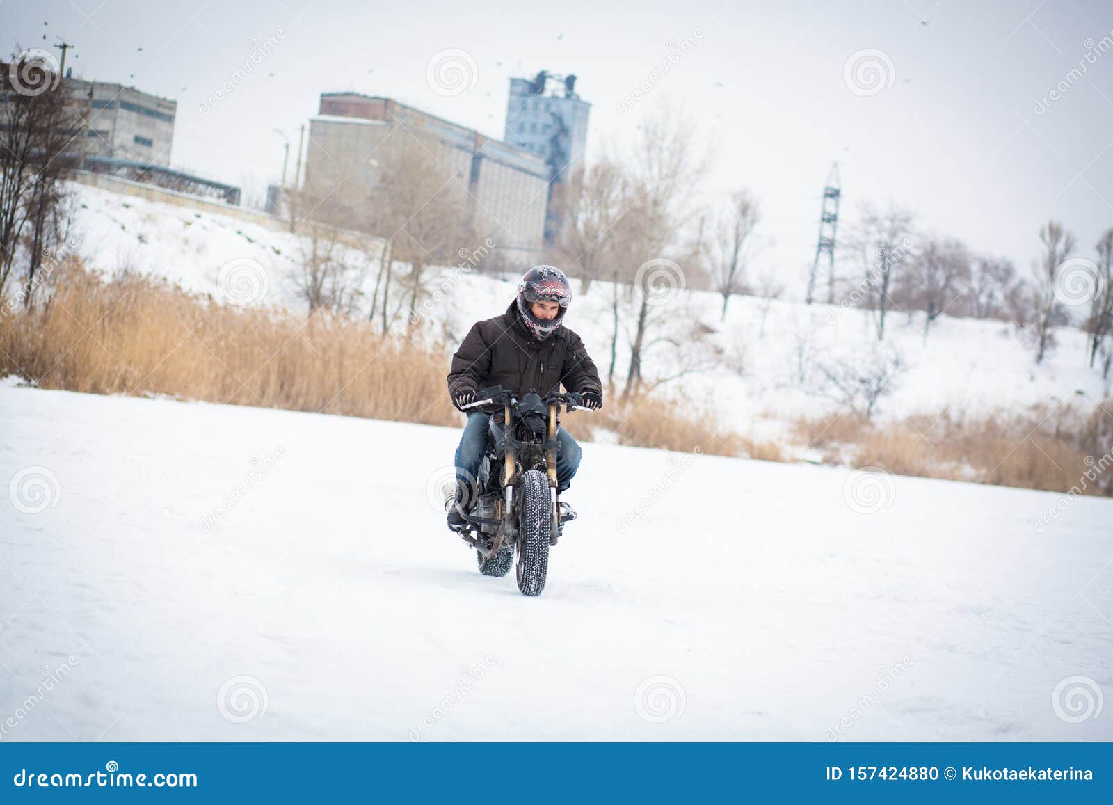 A Guy Rides a Motorcycle on a Frozen Lake Editorial Image - Image of ...