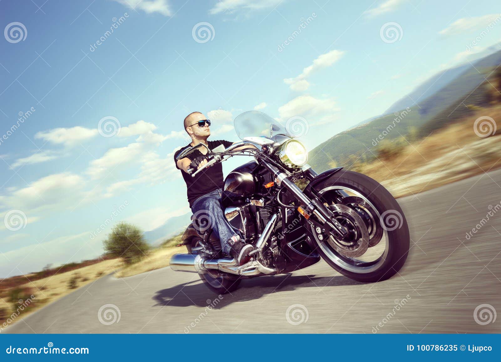 Guy riding a motorcycle stock image. Image of biking - 100786235