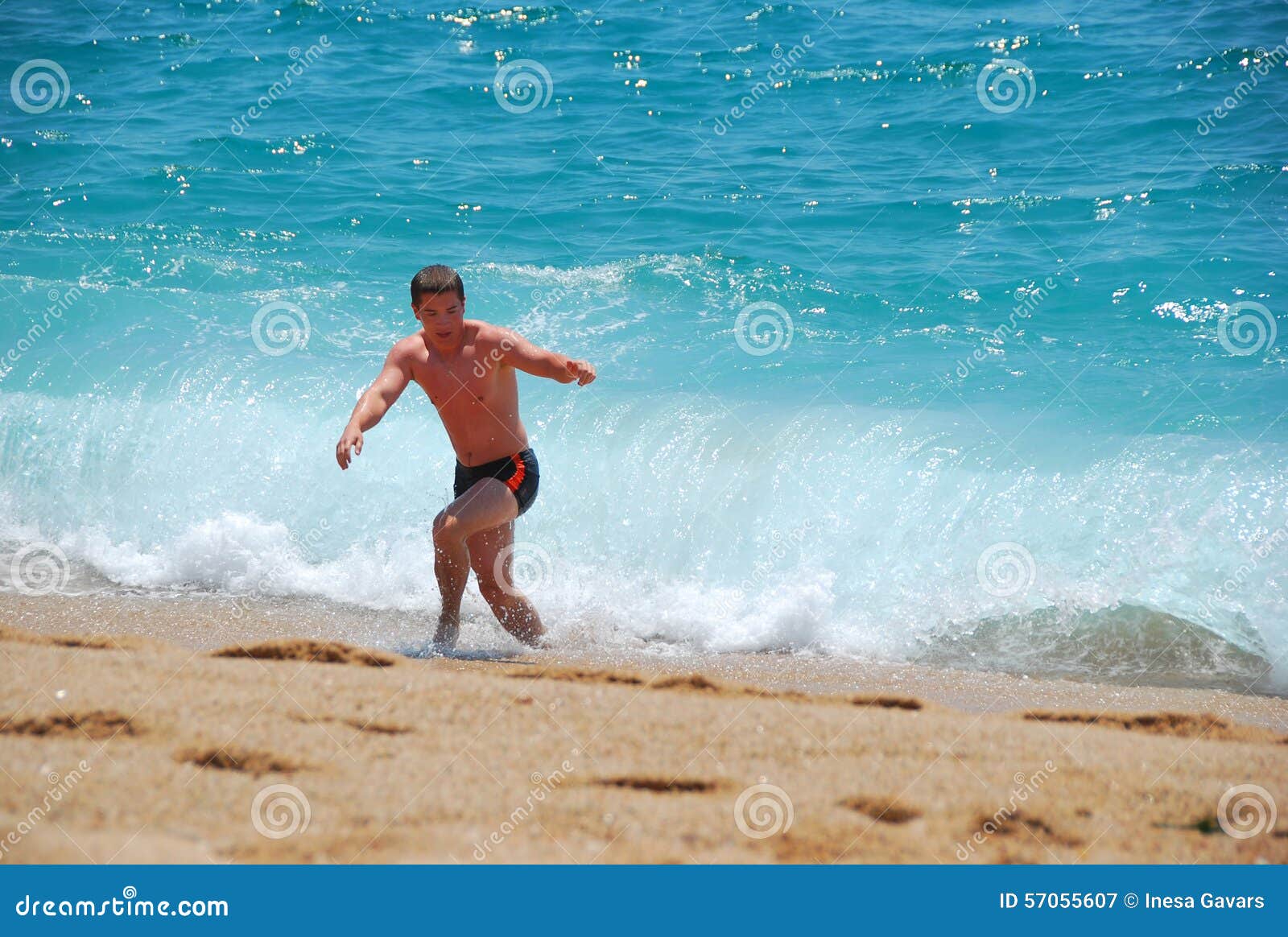 The Guy is Running Away from the Waves Stock Image - Image of male ...