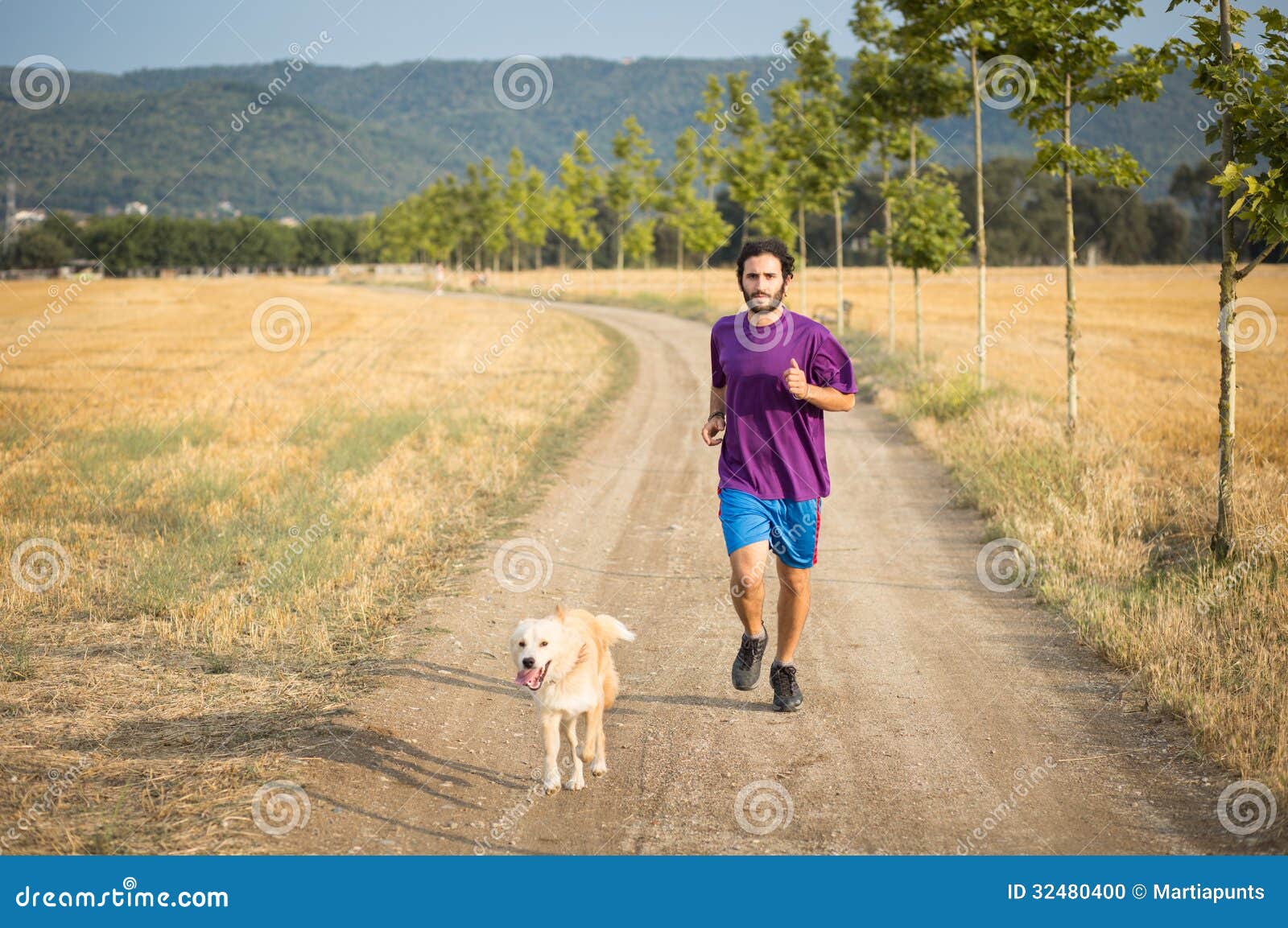 Guy running with a dog stock photo. Image of sport, exercise - 32480400