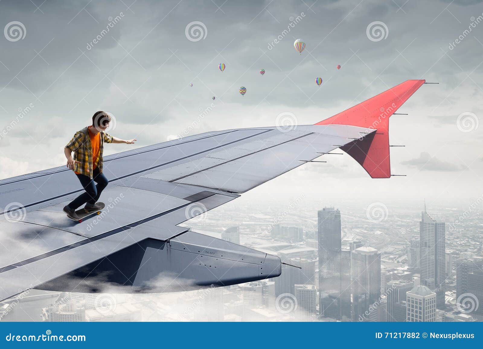 Guy Sakting on Airplane Wing Stock Photo - Image of sport, recreation ...