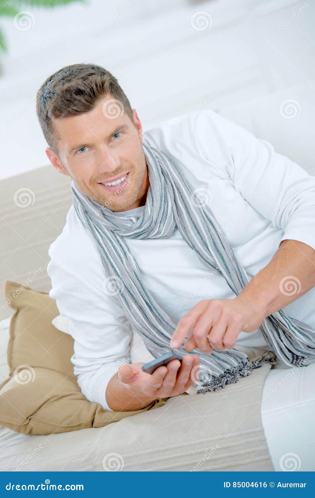 Guy sending text message stock photo. Image of information - 85004616
