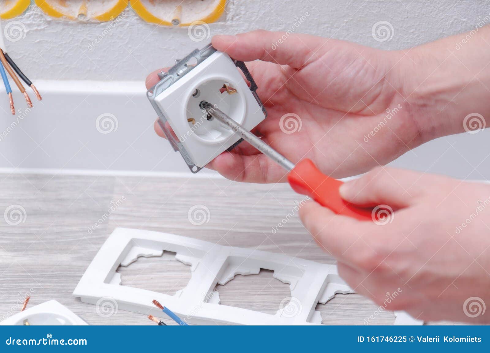 The Guy Sets the Sockets in the Room. Repair in the House Stock Image ...