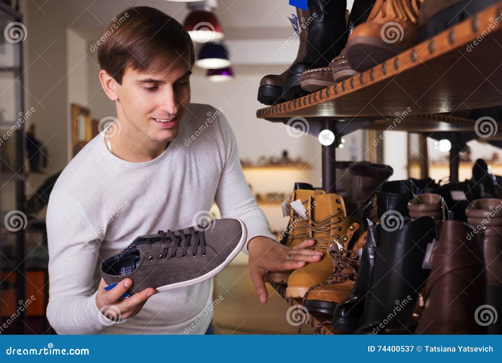 Guy in the shoe shop stock image. Image of modern, consumer - 74400537