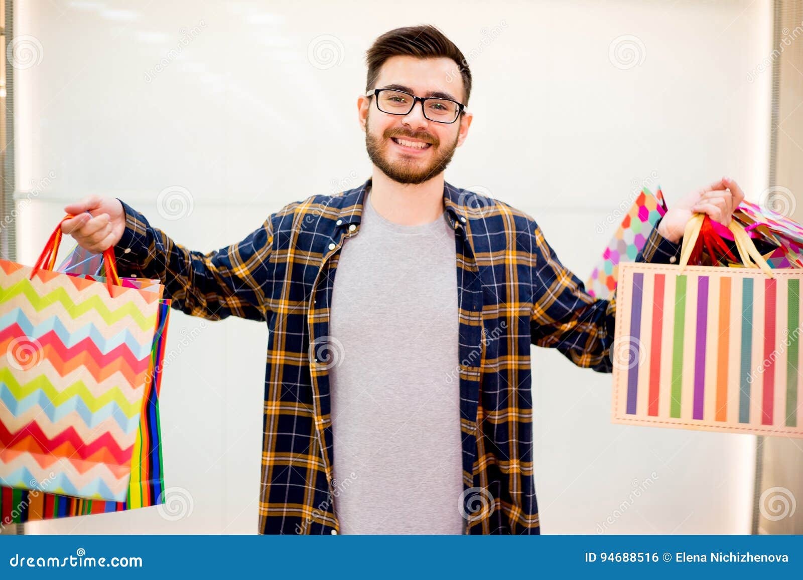 Guy shopping in a mall stock photo. Image of holiday - 94688516