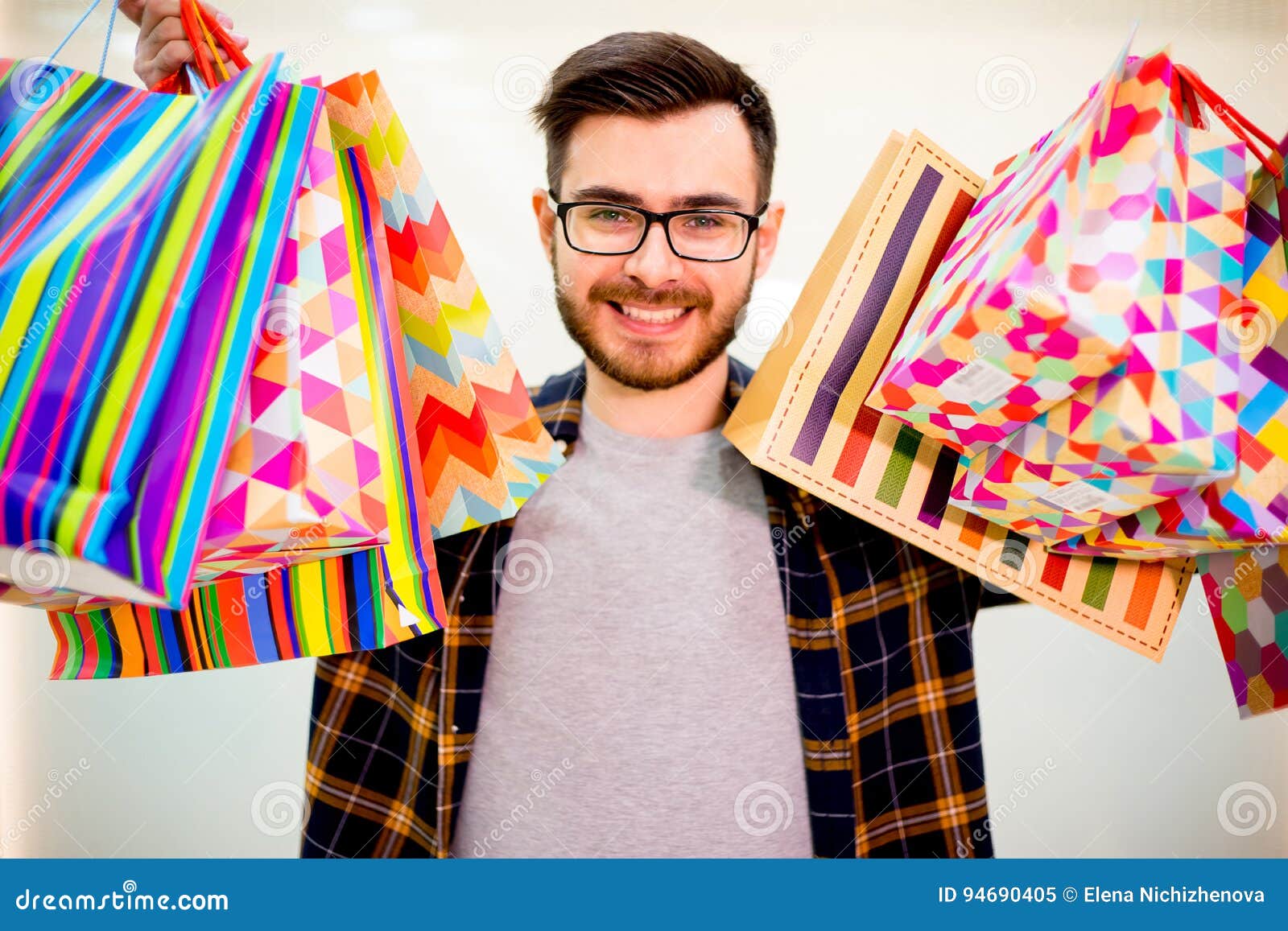 Guy shopping in a mall stock image. Image of consumerism - 94690405