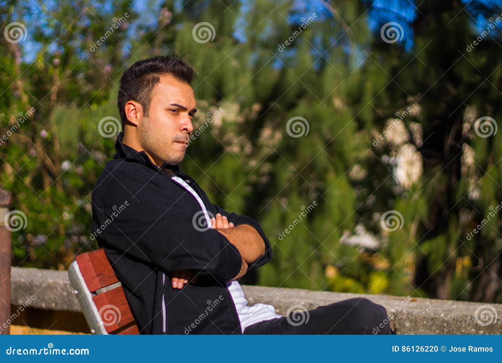 Man on a park bench stock photo. Image of dude, greenery - 86126220