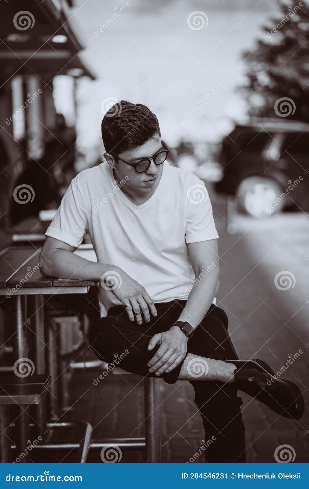 Guy Sitting on the City Street, Look Camera and Around Stock Image ...