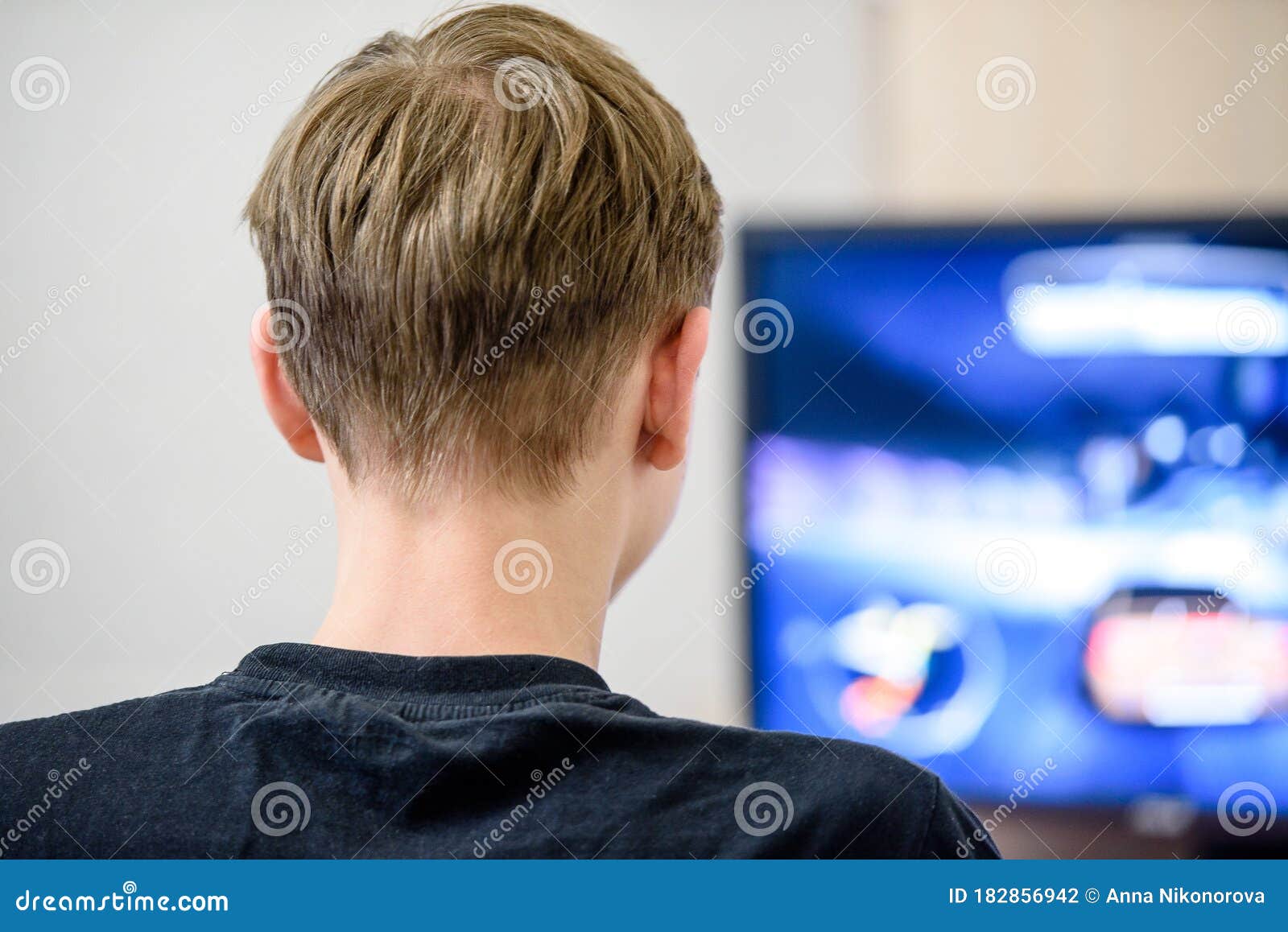 Guy Sitting at the Computer Playing a Game-view from the Back, Close-up ...