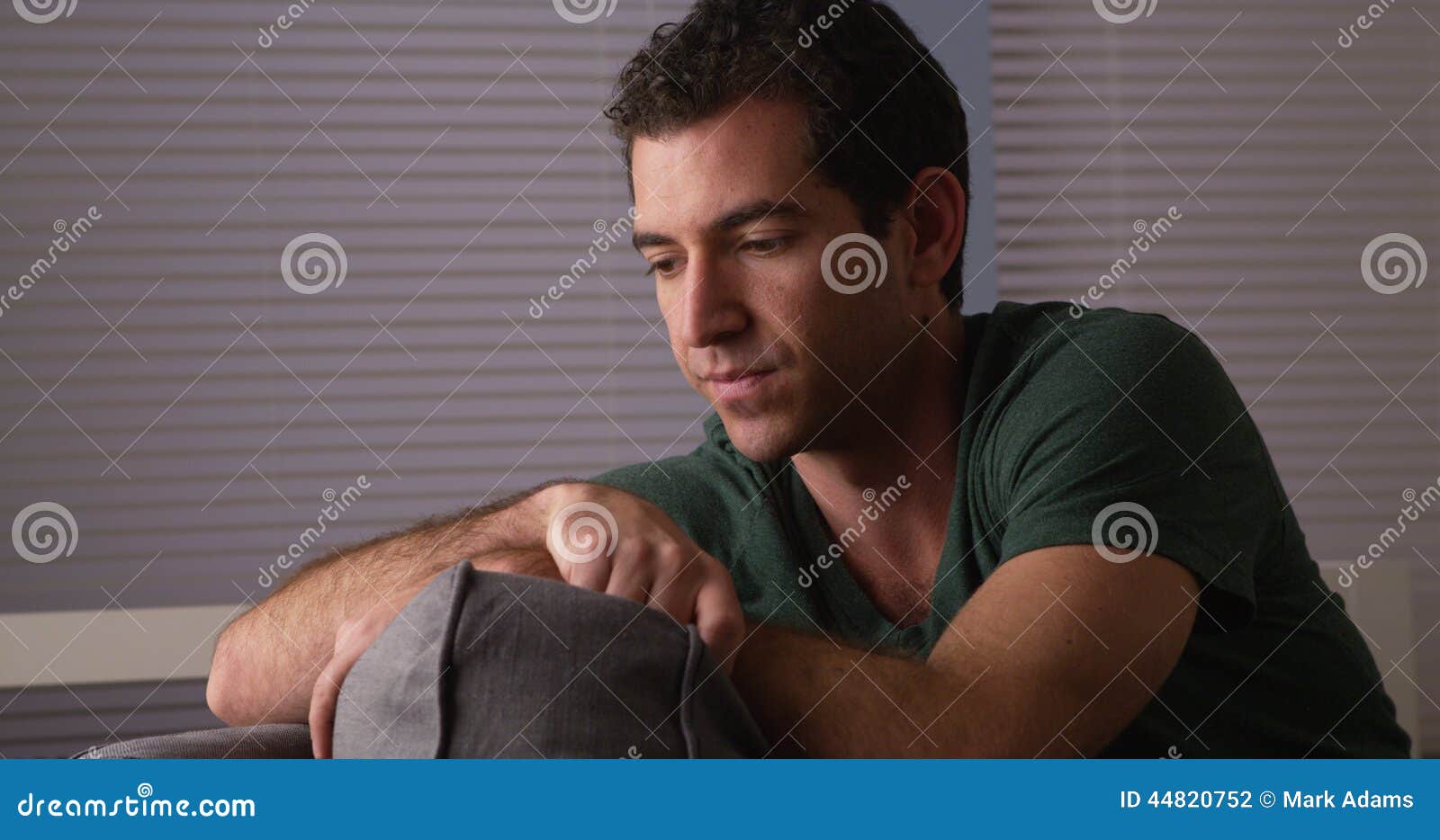 Guy Sitting on Couch Thinking Stock Photo - Image of leisure, portrait ...