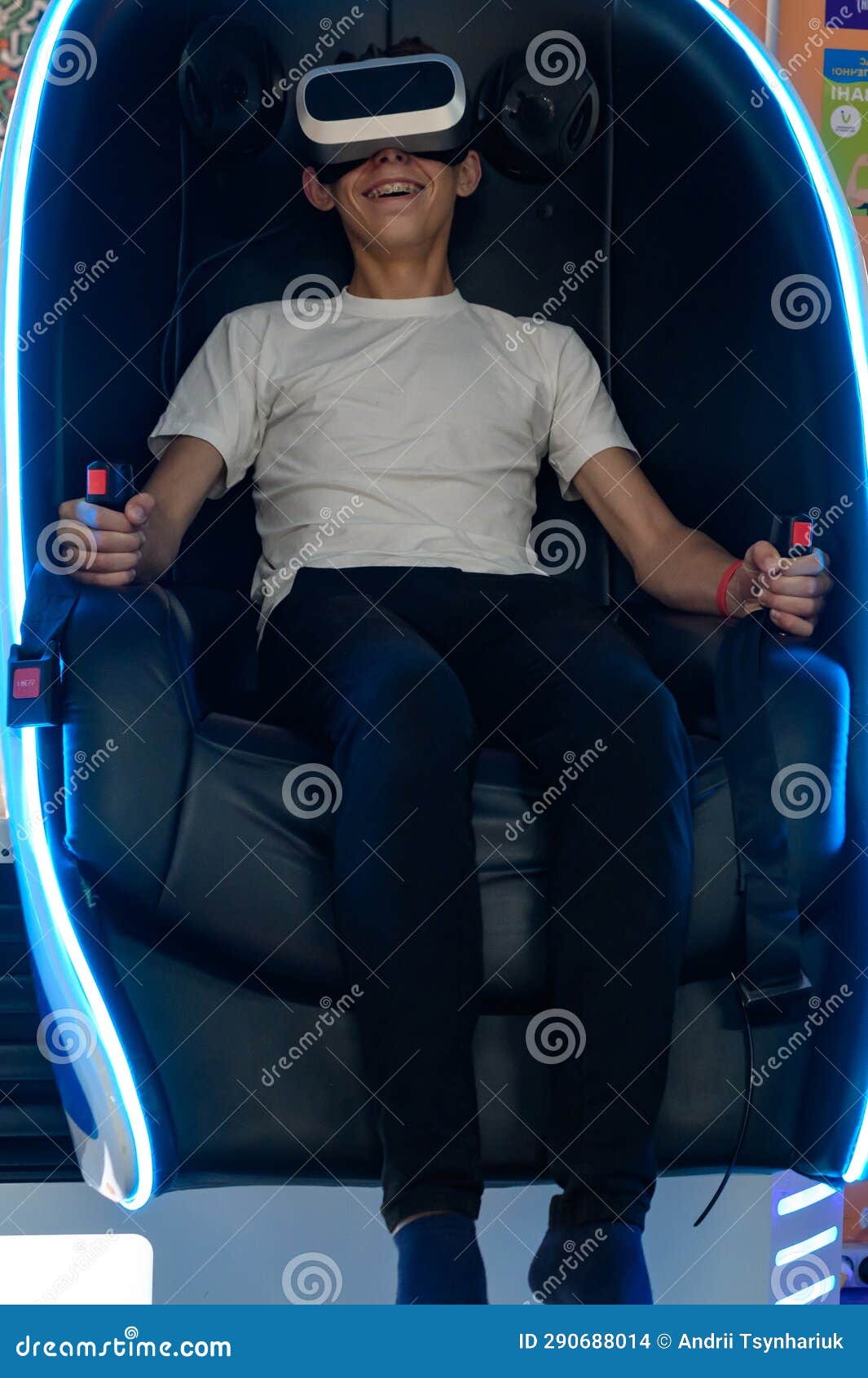 A Guy is Sitting on a Ride with Vr Glasses, Stock Photo - Image of room ...