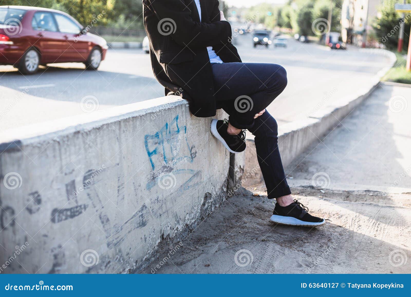 Guy Sitting beside the Road Stock Image - Image of road, recreation ...