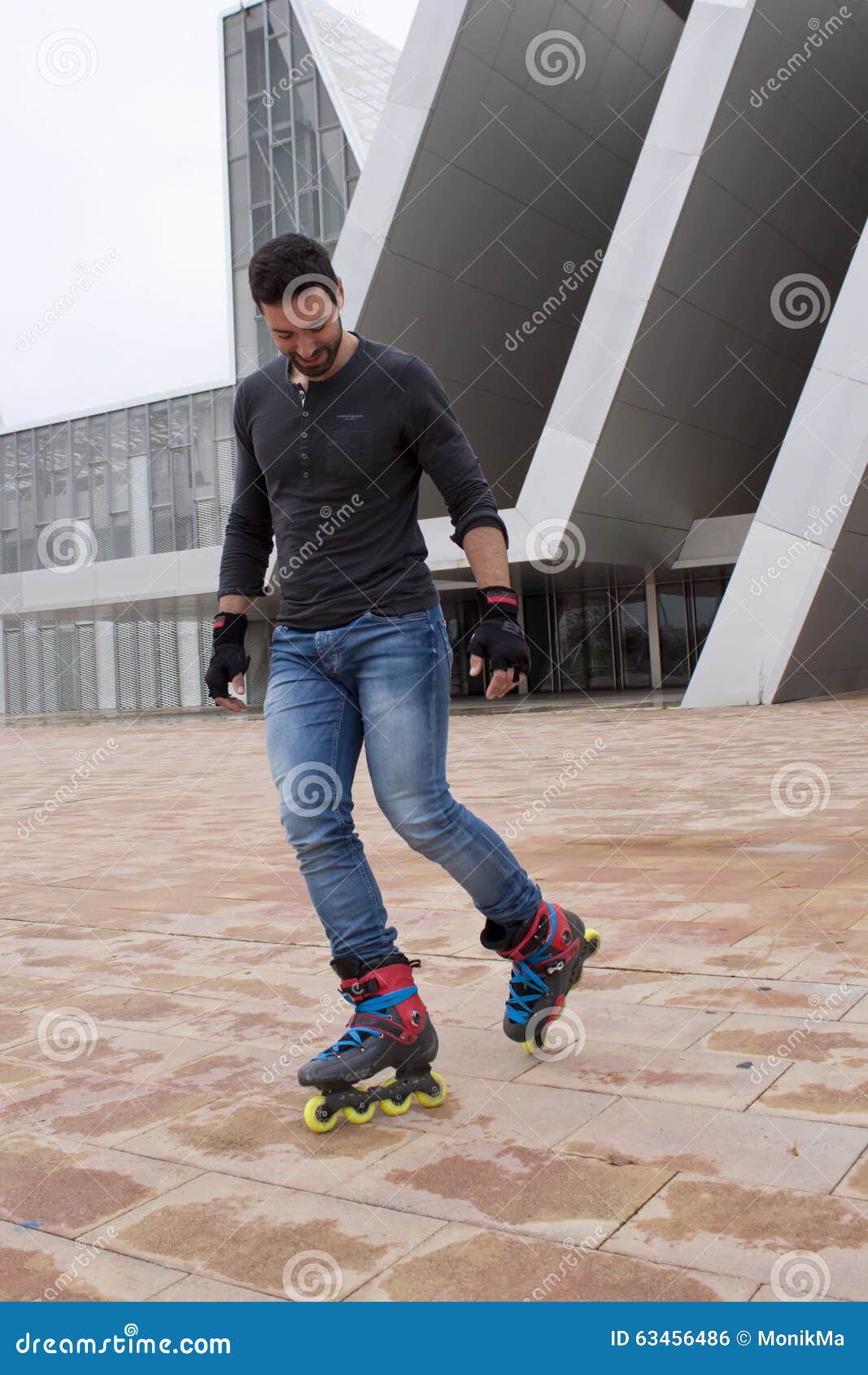 Guy Skating in-line in the Street Stock Photo - Image of turning ...