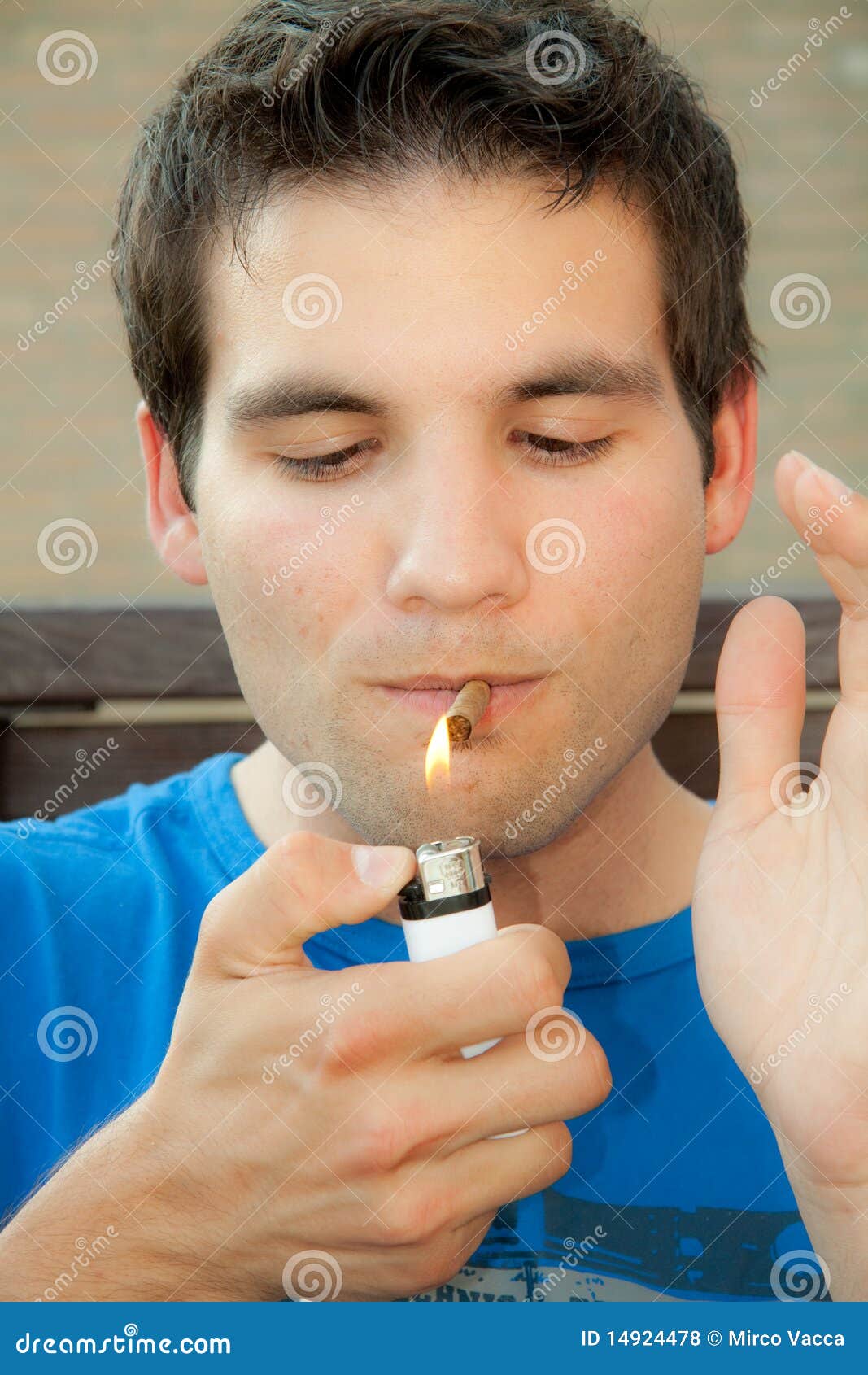 Guy smoking a cigarette stock photo. Image of sleepy - 14924478