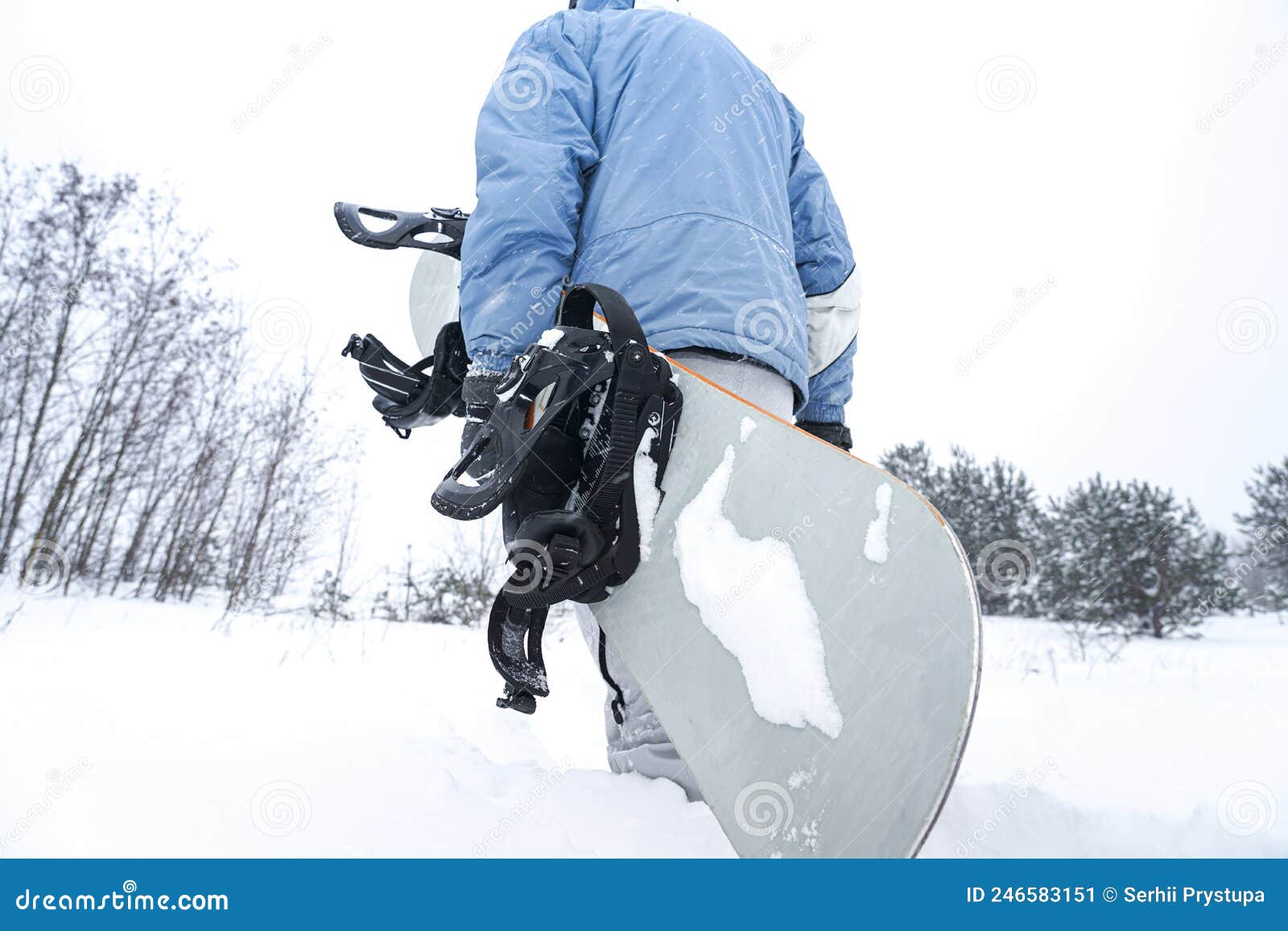 The Guy Snowboarder Goes on a Snowy Slope. Stock Image - Image of ...