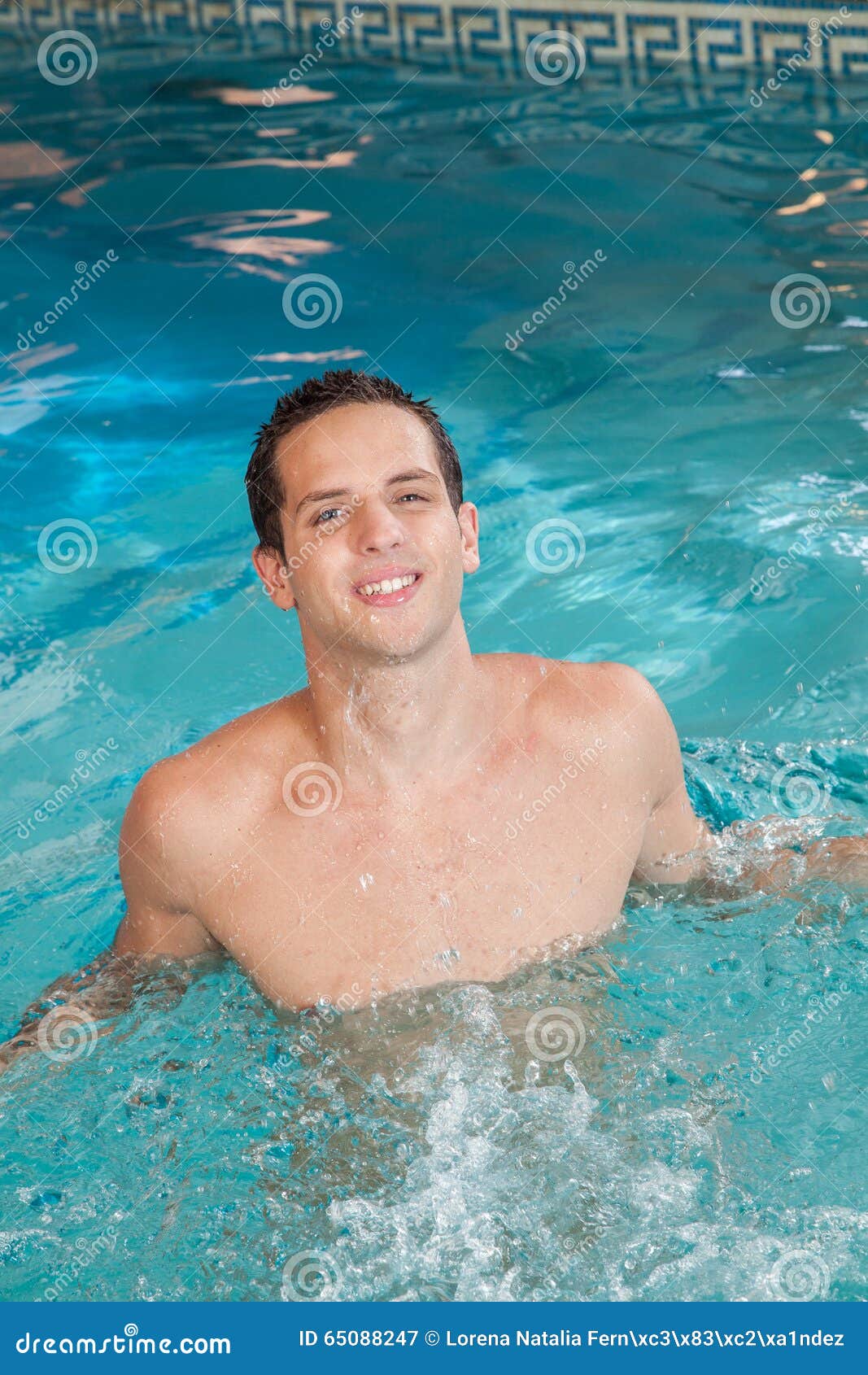 Guy splashing water stock image. Image of relax, indoor - 65088247