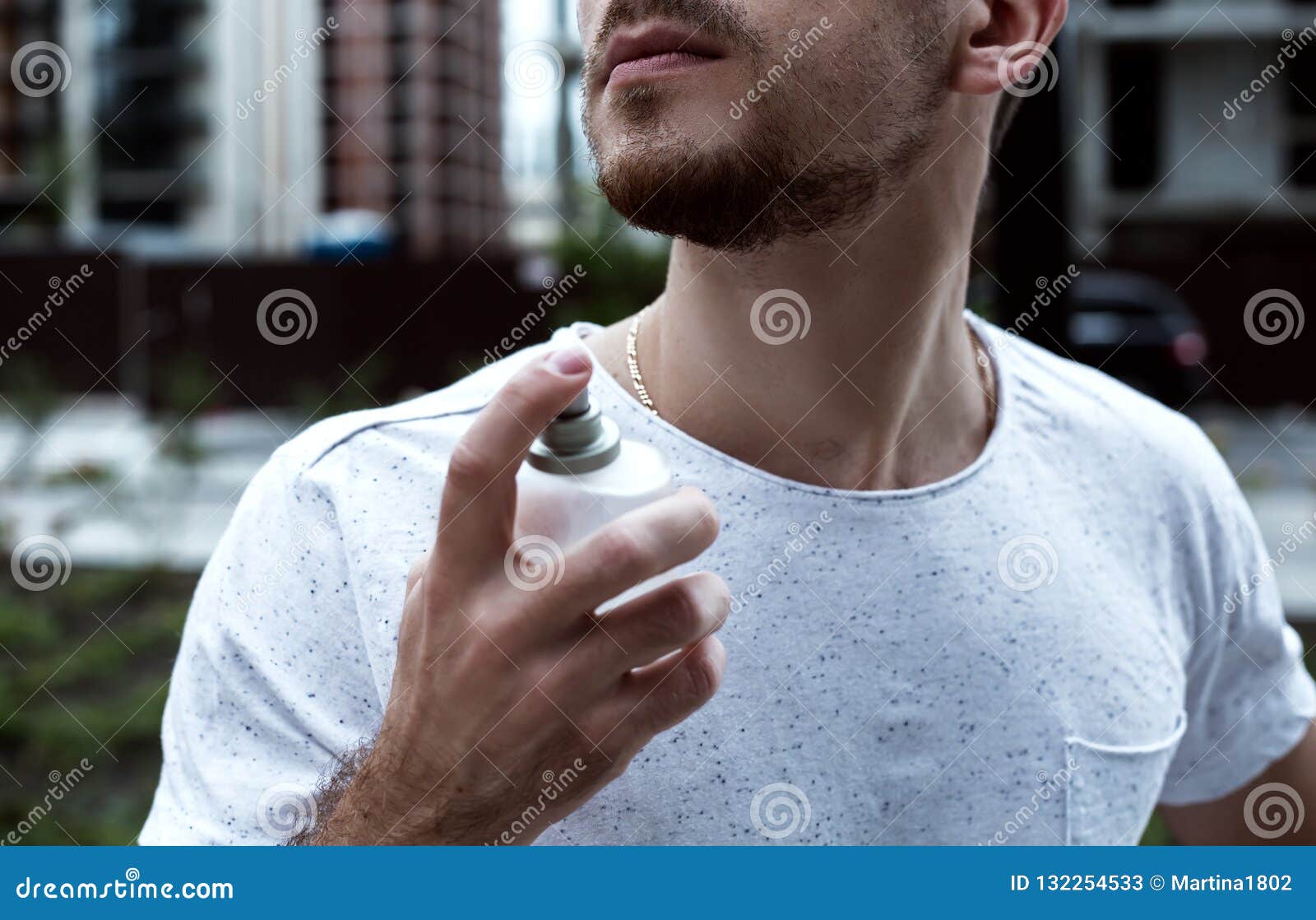 Guy sprays perfume stock image. Image of caucasian, businessman - 132254533