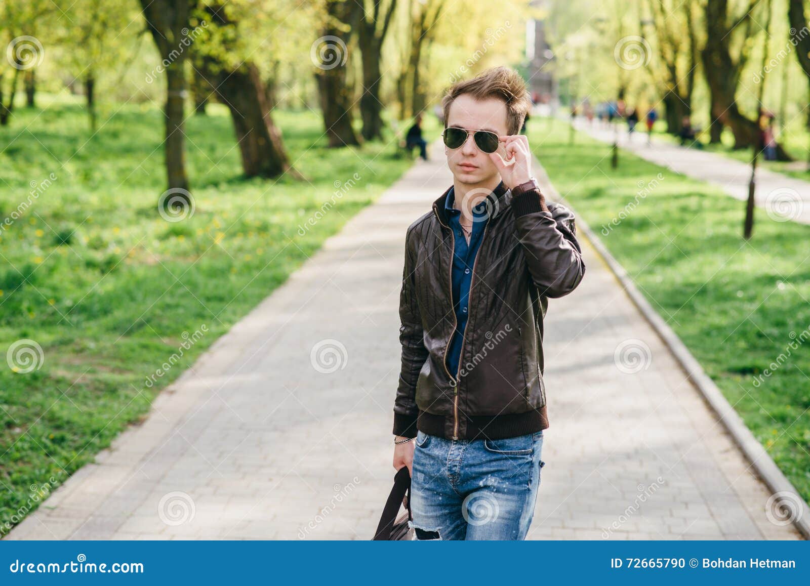 Guy in spring day stock photo. Image of glasses, hand - 72665790