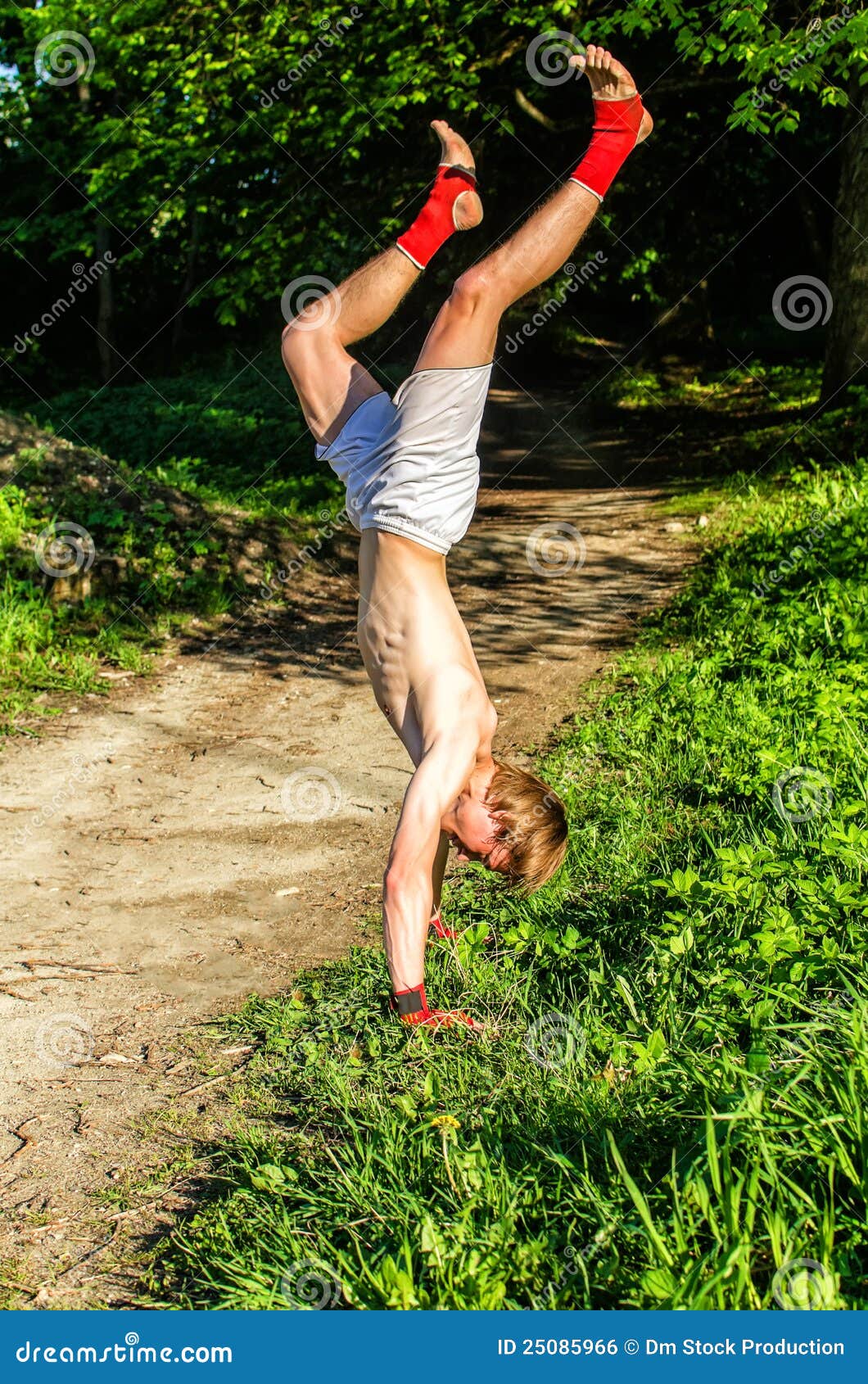 Guy stand on his hands stock photo. Image of handsome - 25085966