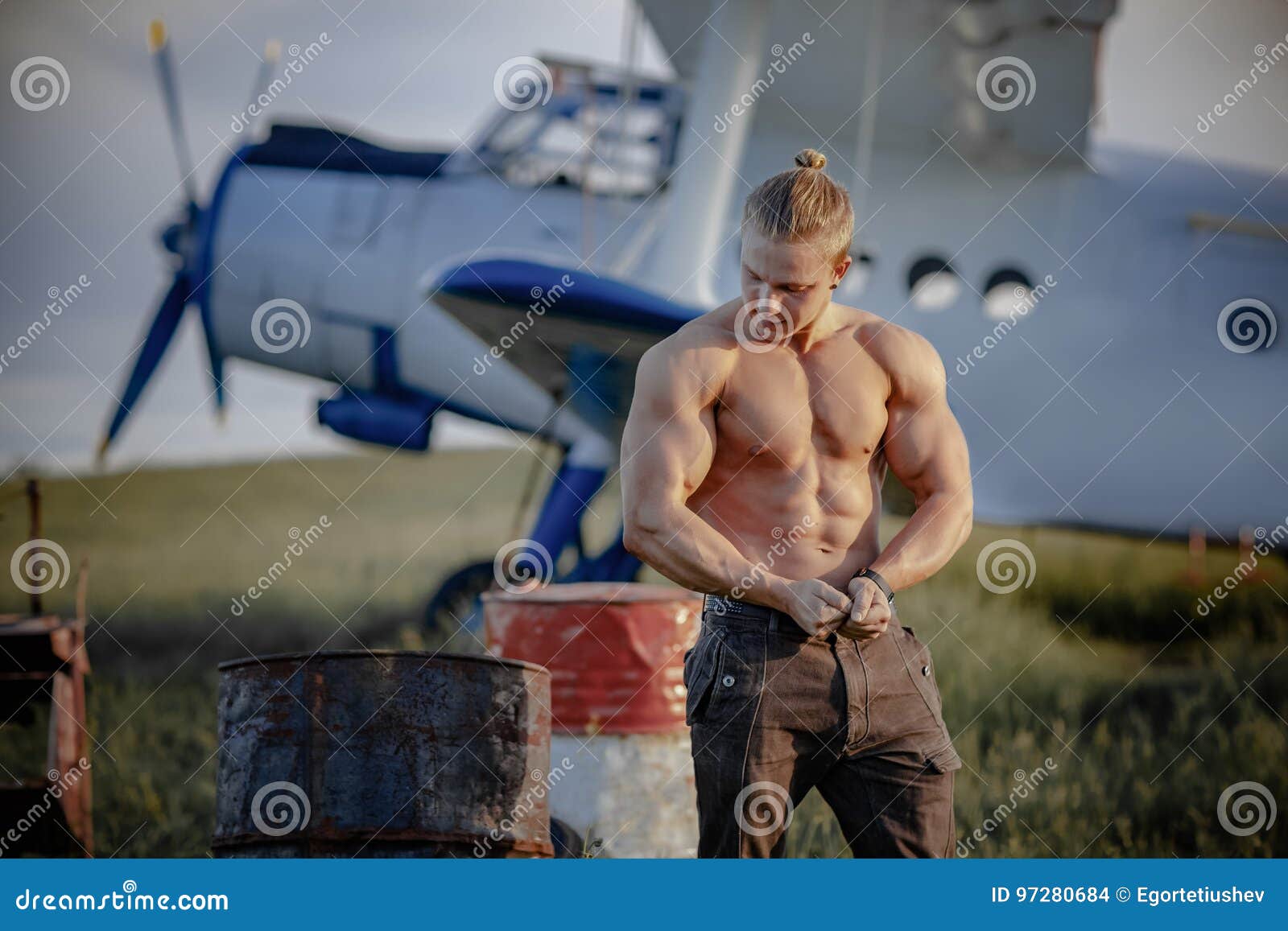 A Guy is Standing by the Plane. Stock Photo - Image of macho, strong ...