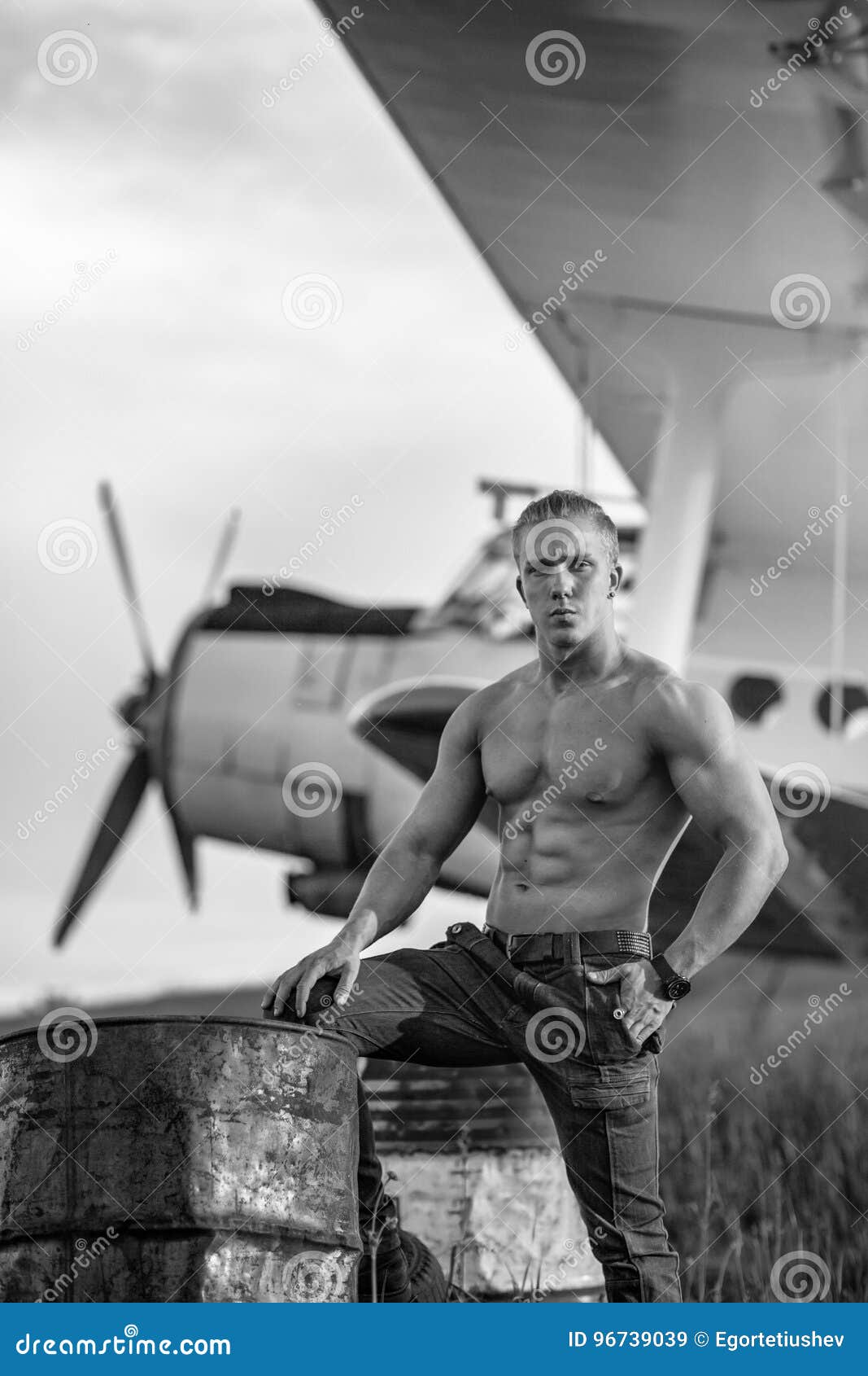A Guy is Standing by the Plane. Stock Image - Image of pilot, muscle ...