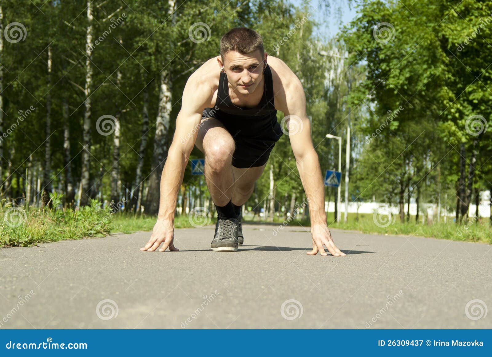Guy starts at the track stock image. Image of health - 26309437
