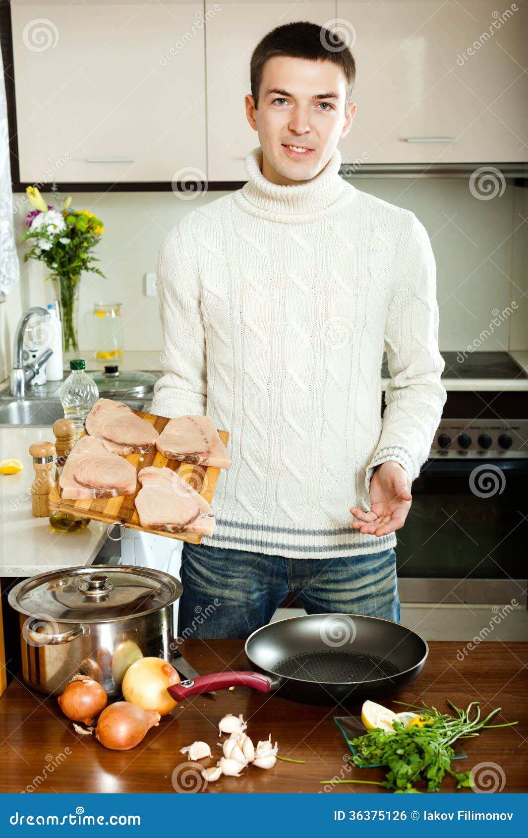 Guy with steak at home stock photo. Image of mackerel - 36375126