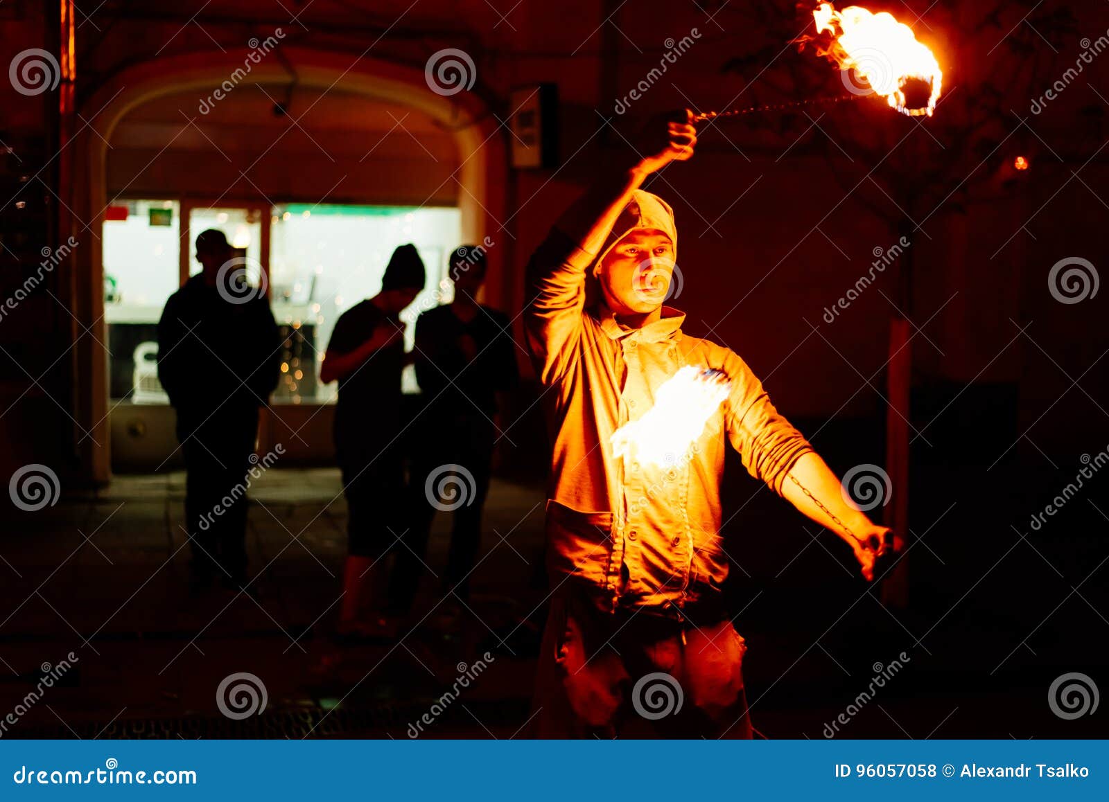The Guy on the Street Performs with Fire Torches Stock Photo - Image of ...