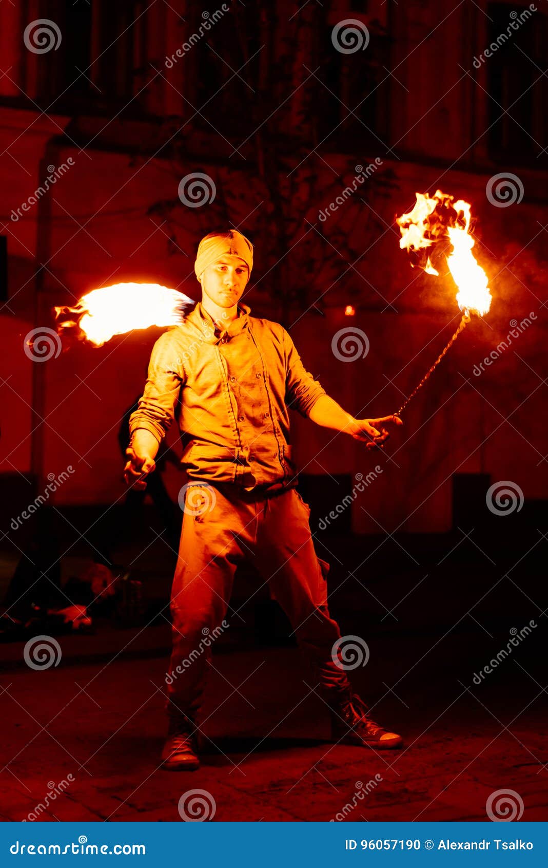 The Guy on the Street Performs with Fire Torches Stock Photo - Image of ...