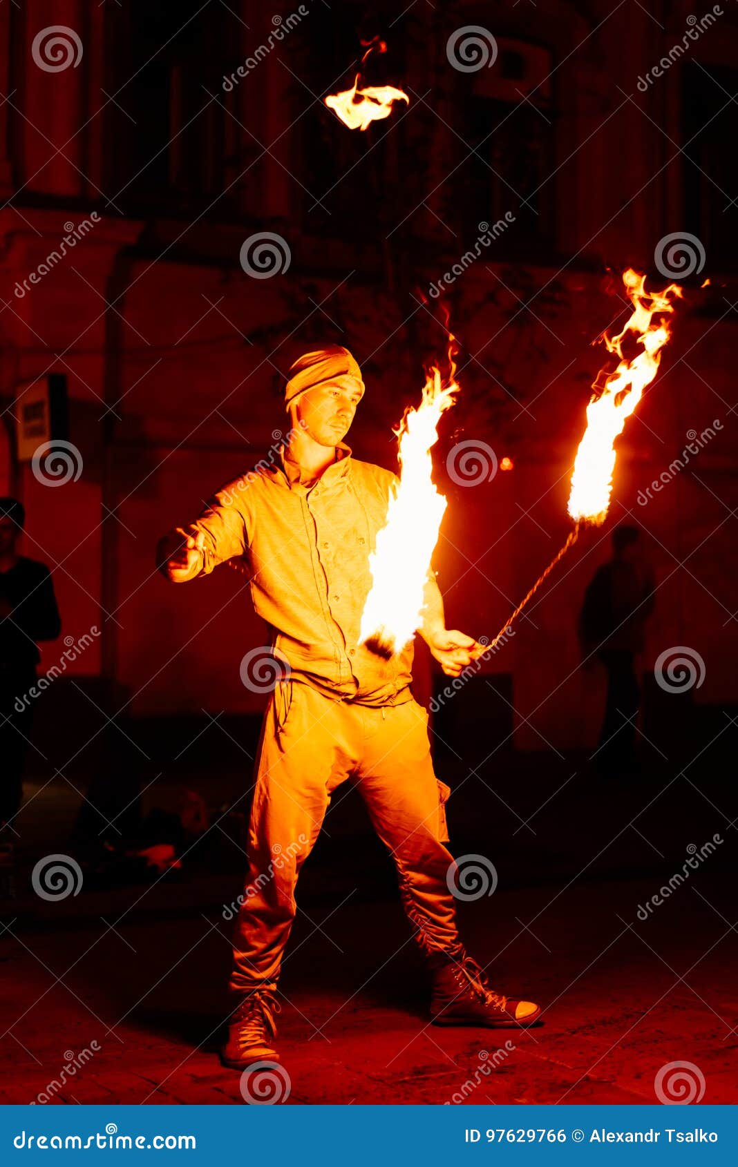 The Guy on the Street Performs with Fire Torches Stock Photo - Image of ...