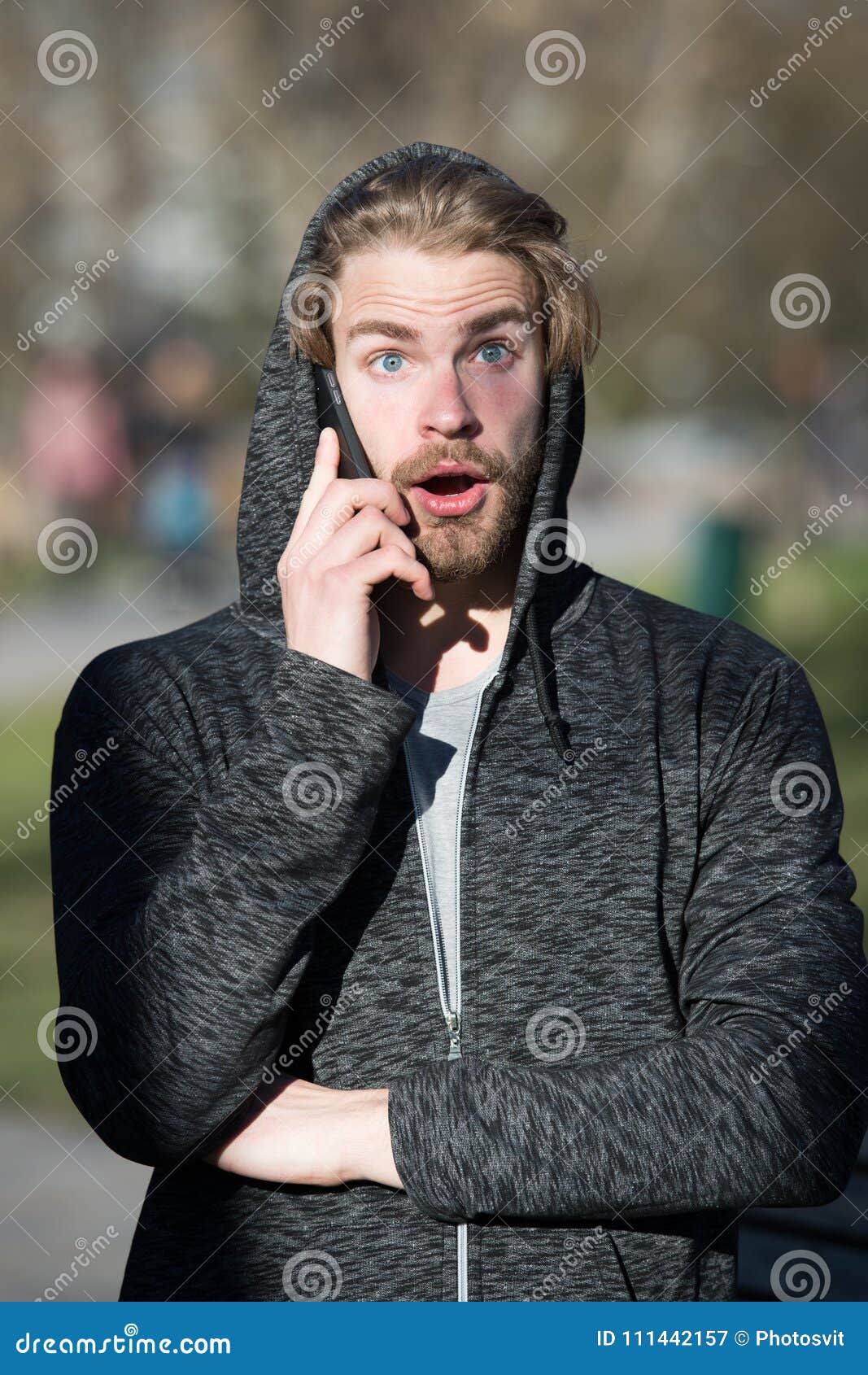 Guy with Surprised Face Talk on Smartphone in Park, Communication Stock ...