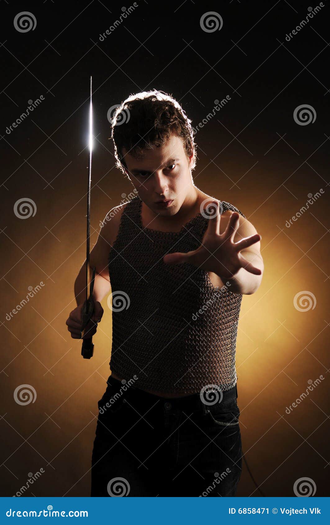 Guy with a sword stock image. Image of sword, holding - 6858471