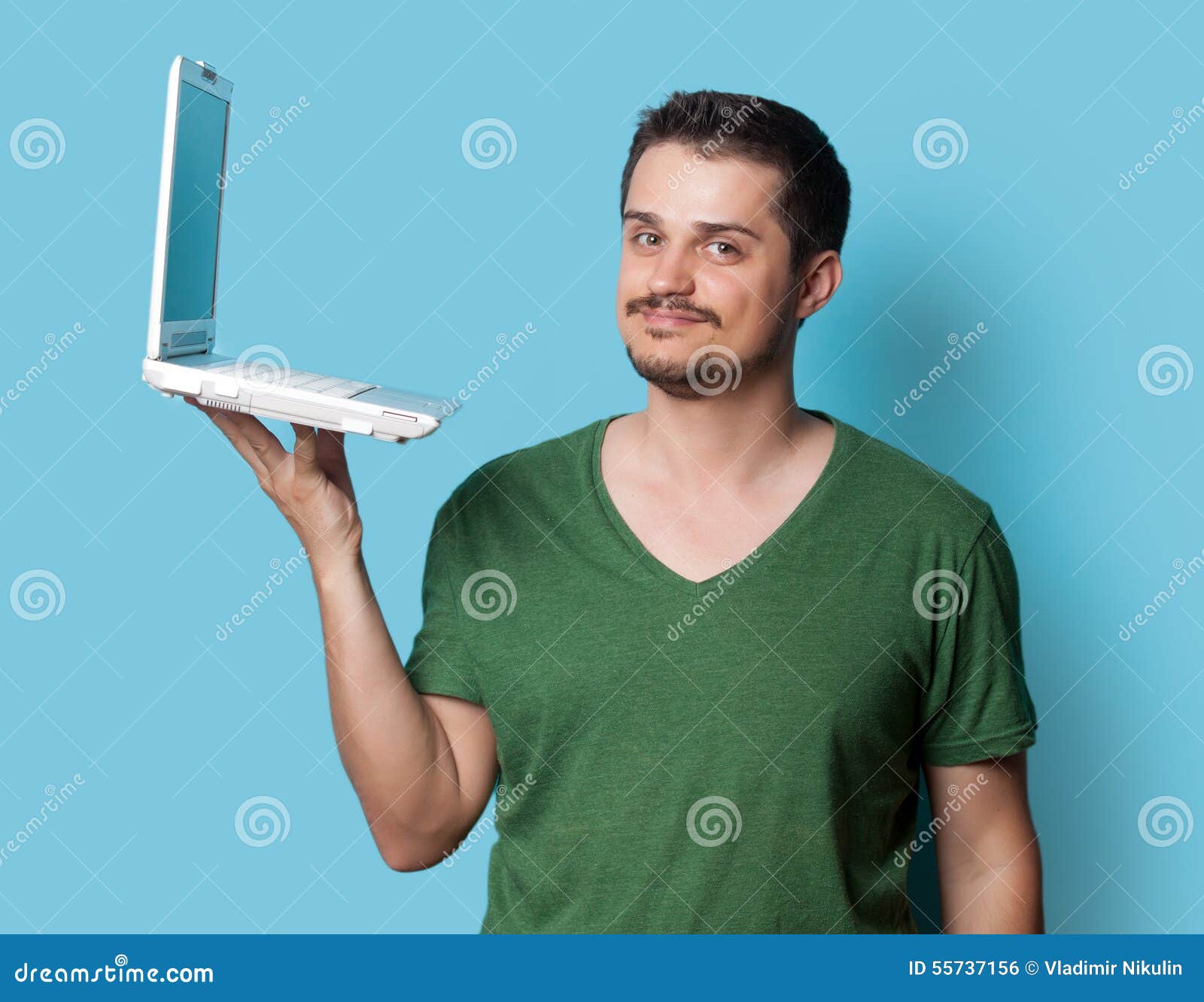 Guy in T-shirt with Laptop Computer Stock Photo - Image of shirt ...