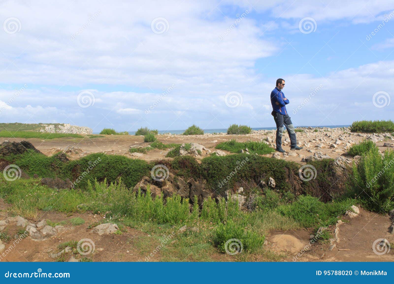 Guy Thinking in a Cloudless Day Near the Ocean Stock Photo - Image of ...