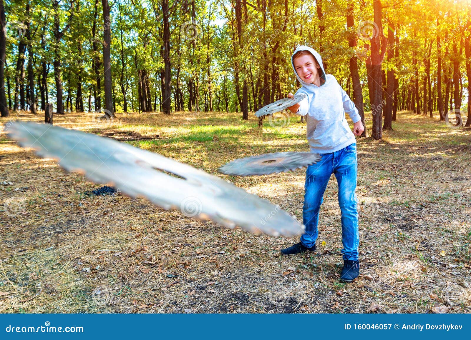 The Guy Throws a Circular Knife To Attack the Enemy in the Forest ...