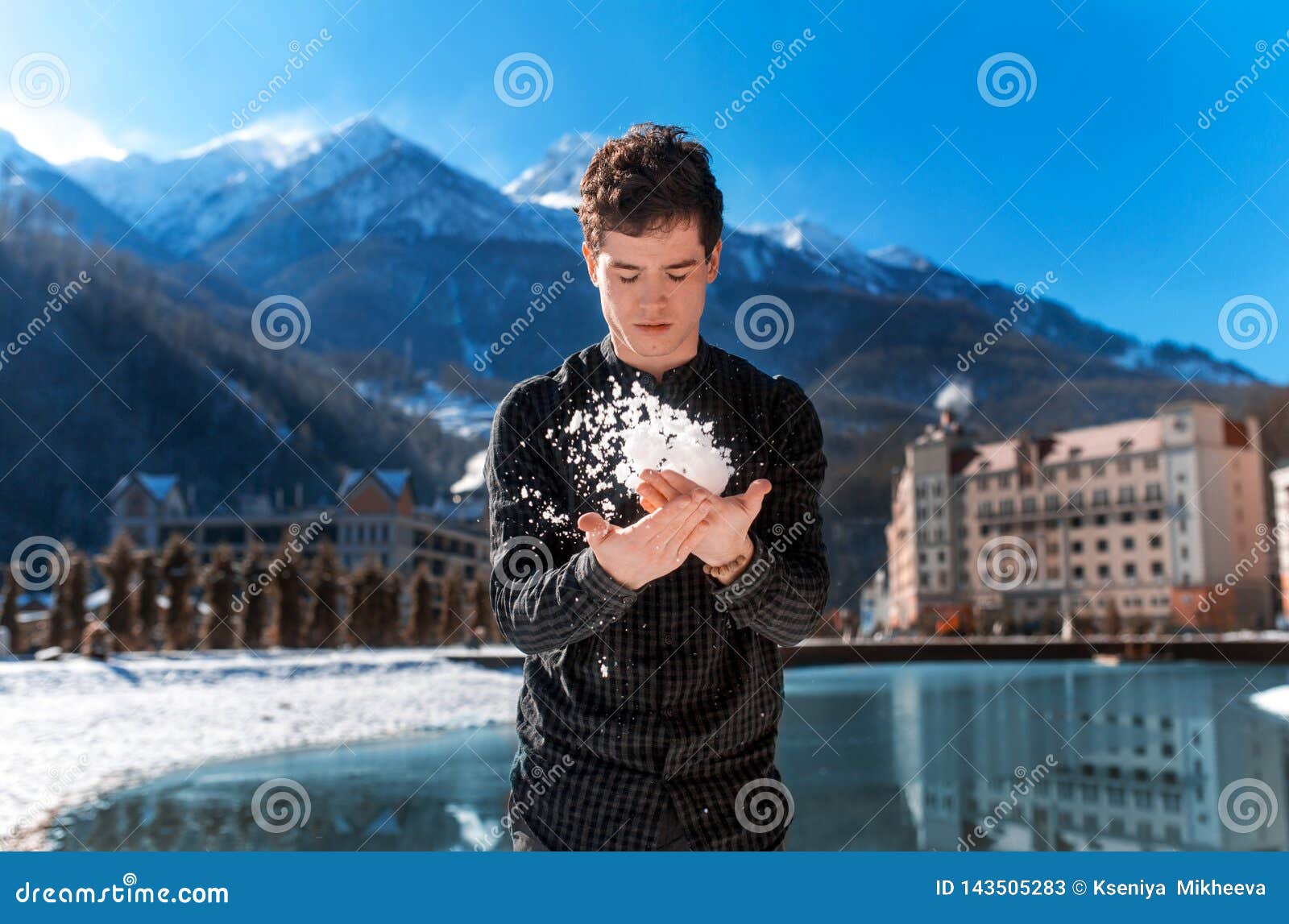 The Guy Throws Snow Against the Mountains, Around Winter Stock Image ...
