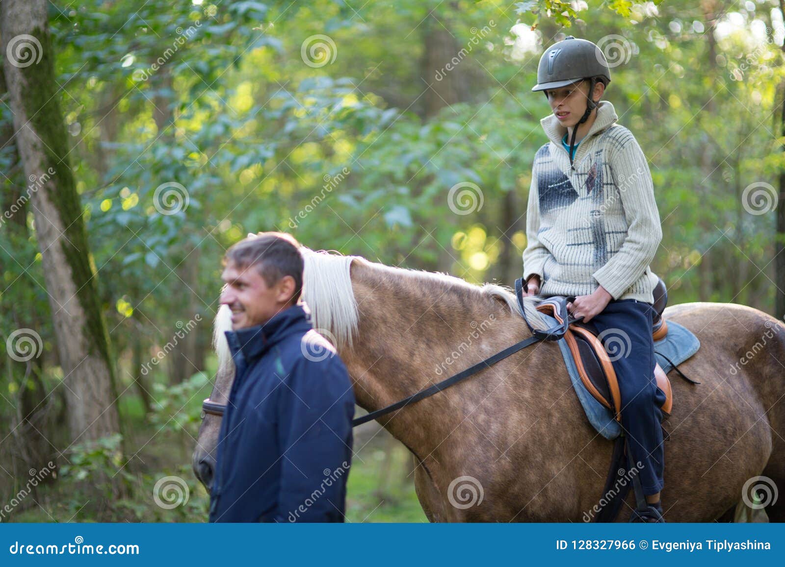 Guy to ride a horse stock photo. Image of rider, walk - 128327966