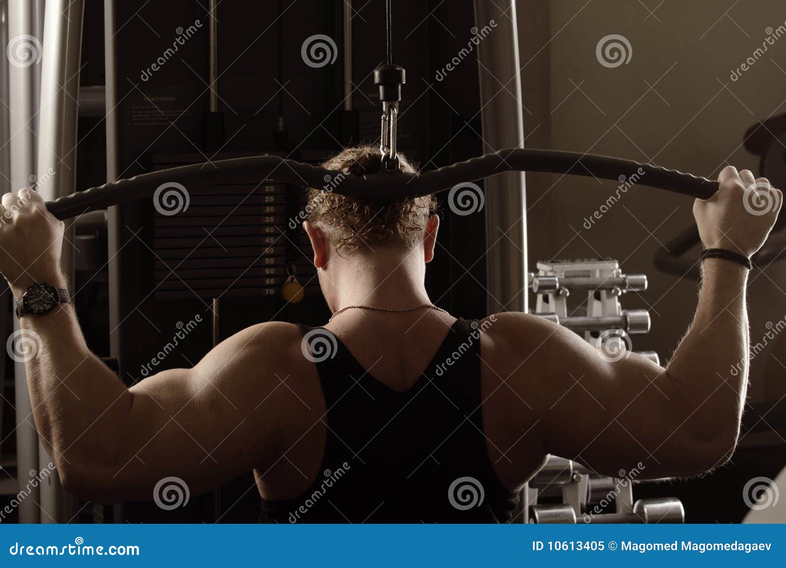 Guy training back muscles stock image. Image of fitness - 10613405