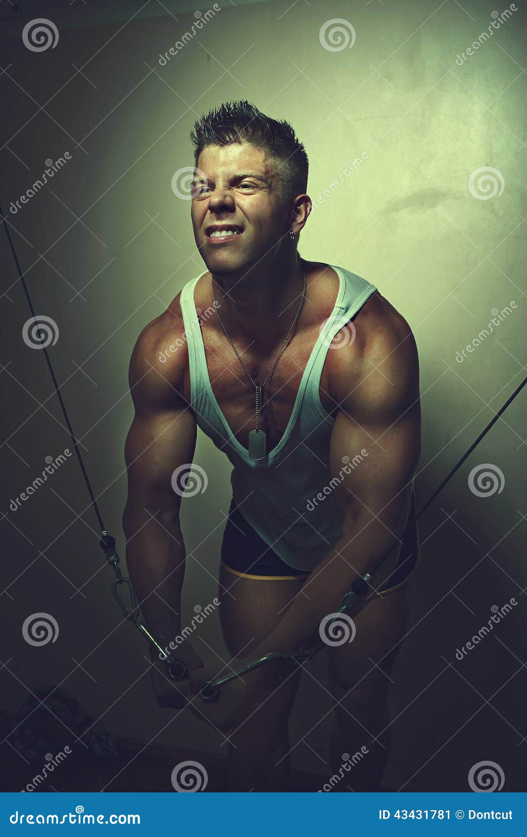 Guy Trains His Pecs Using Crossover Stock Image - Image of bodybuilder ...