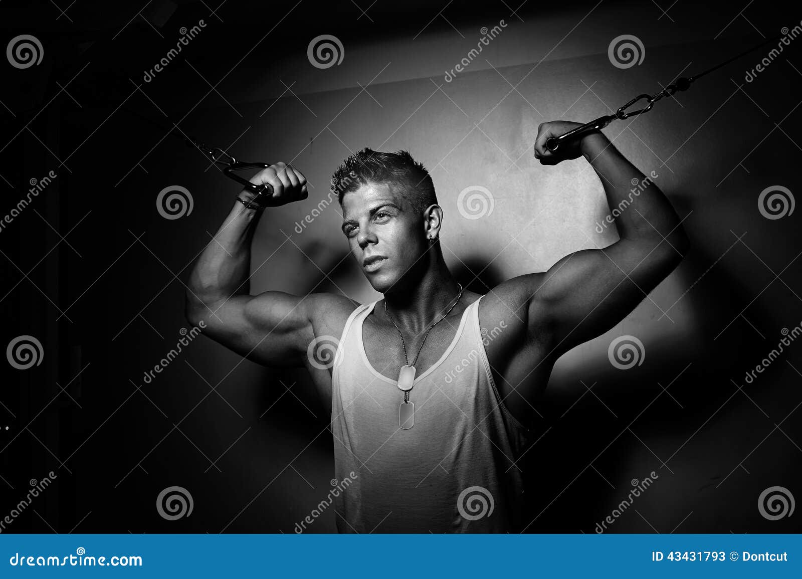 Guy Trains His Pecs Using Crossover Stock Image - Image of hands ...