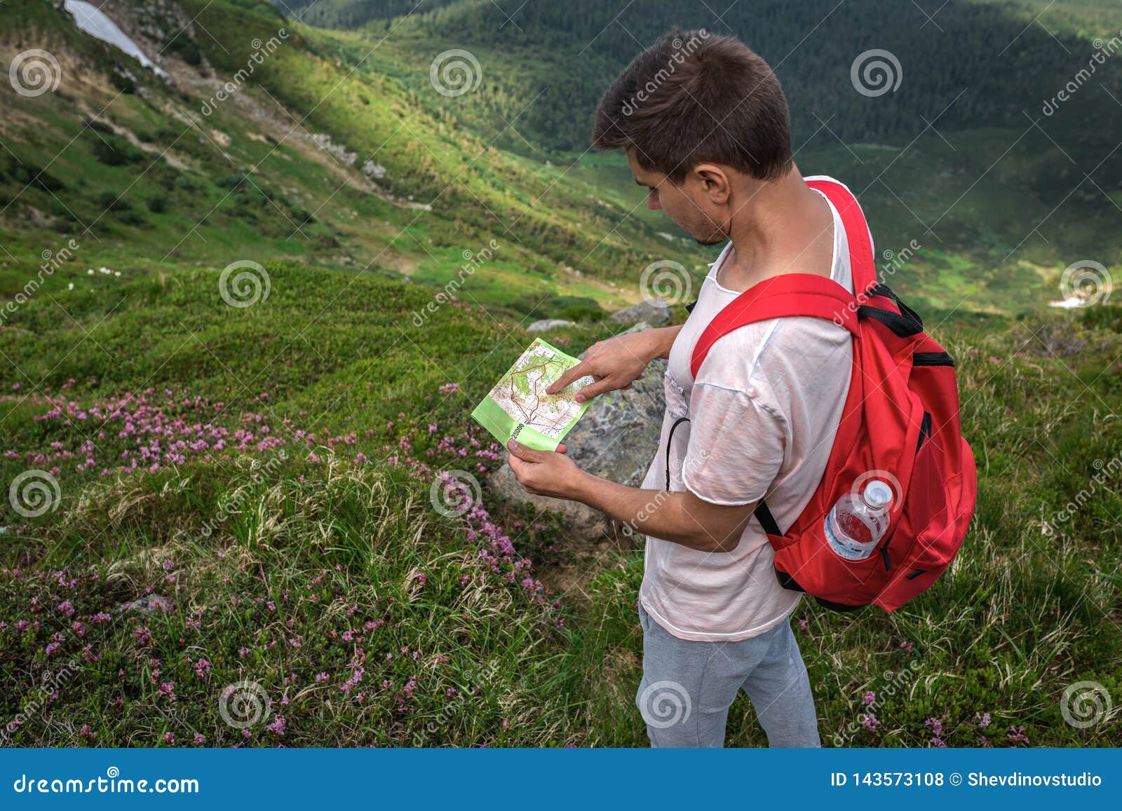 Guy Man Traveler with Red Backpack Lost on Mountain Holds Map. Hiking ...