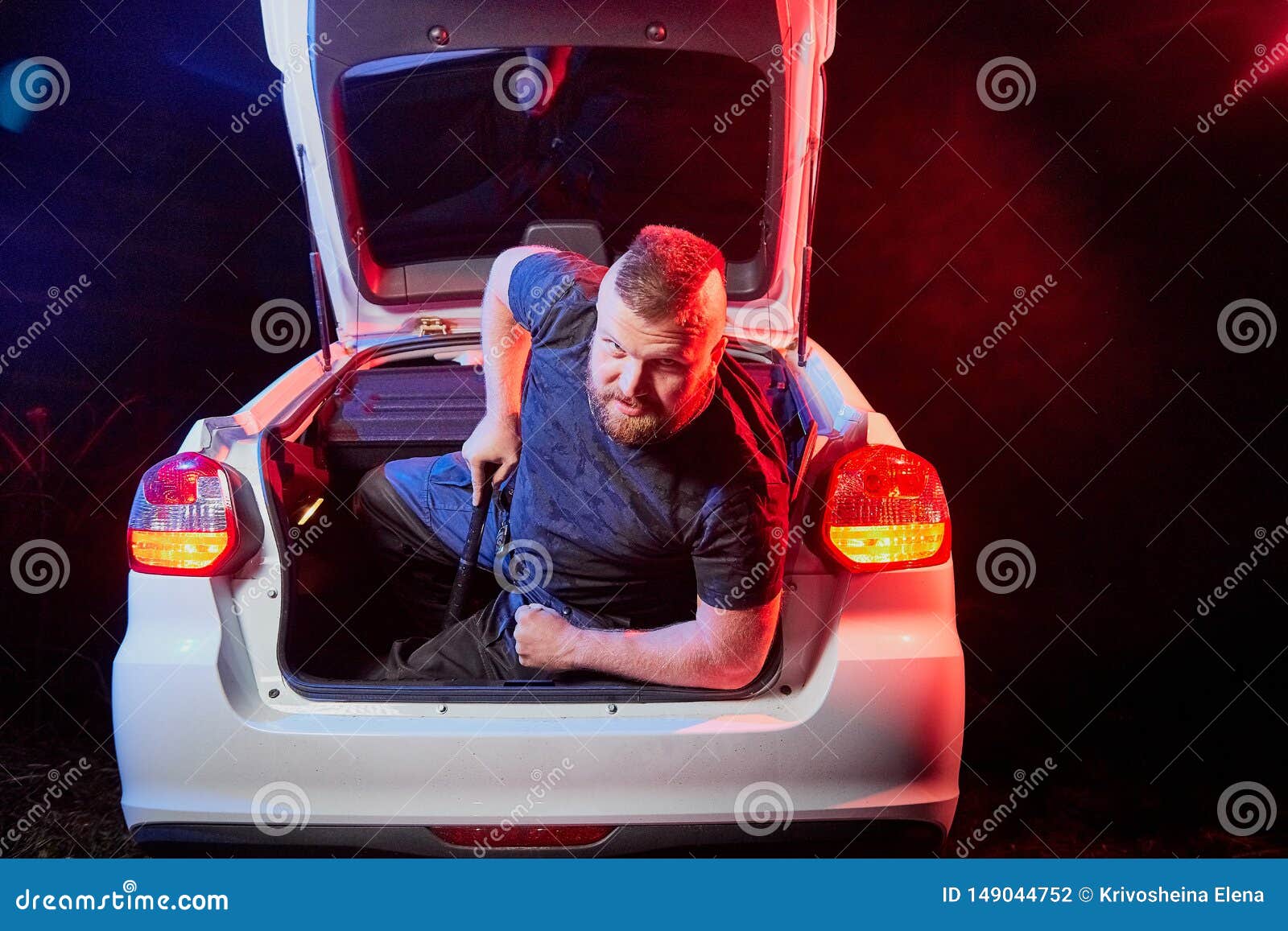 Guy in the Trunk of a Car in a Night Time Stock Photo - Image of grass ...