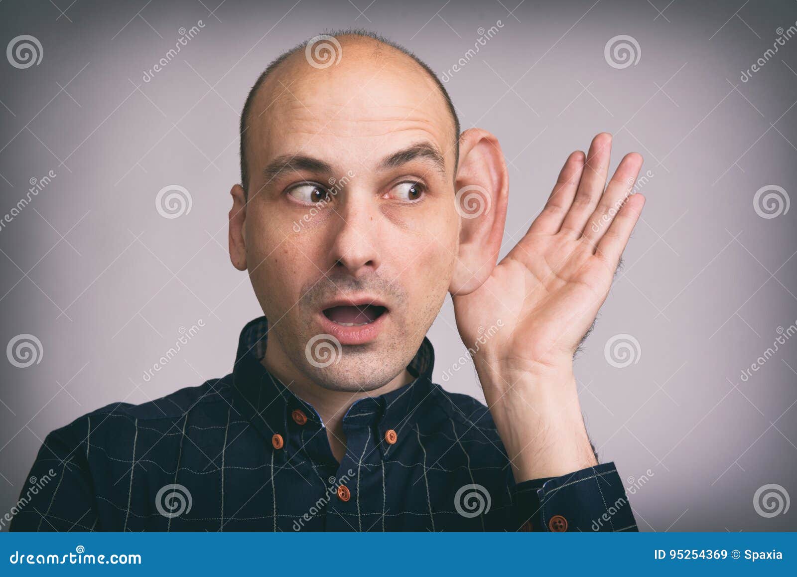 Guy Trying To Secretly Listen in on a Conversation Stock Image - Image ...