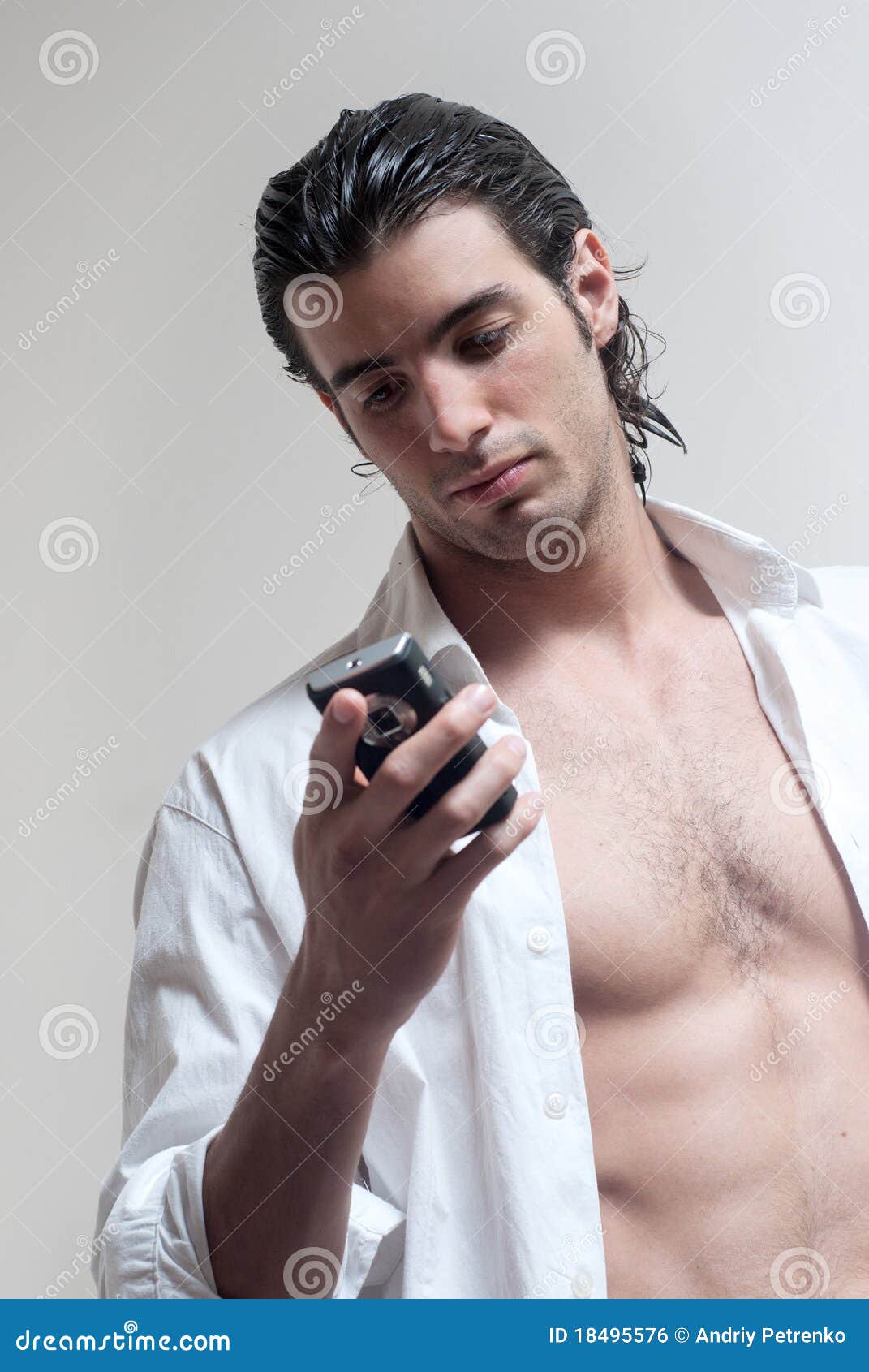 Guy Typing a Text Message on Cellphone Stock Photo - Image of mobile ...
